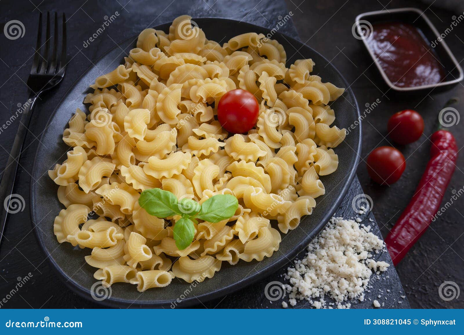 Uncooked Creste Di Gallo Pasta and Ingredients for it Cooking Stock ...
