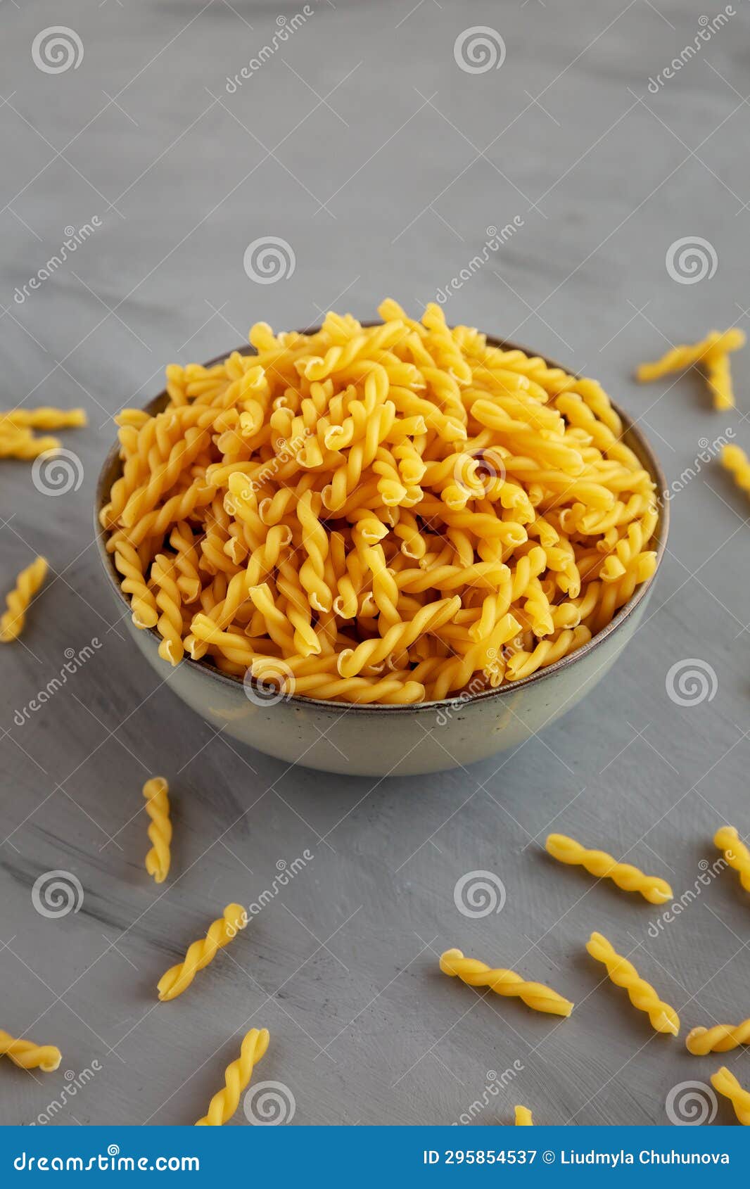 Uncooked Dry Gemelli Pasta in a Bowl, Side View Stock Image - Image of ...