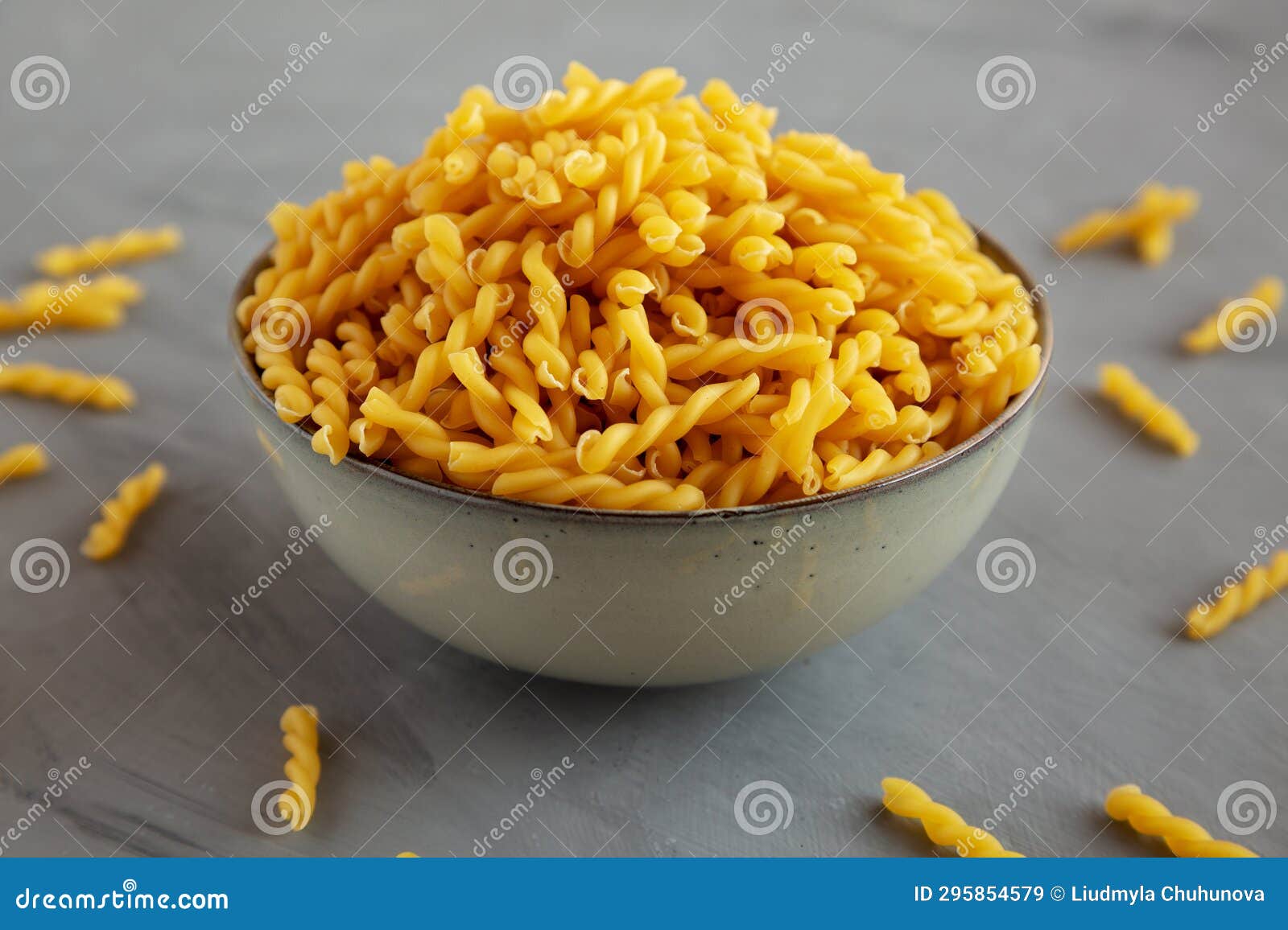 Uncooked Dry Gemelli Pasta in a Bowl, Side View Stock Image - Image of ...