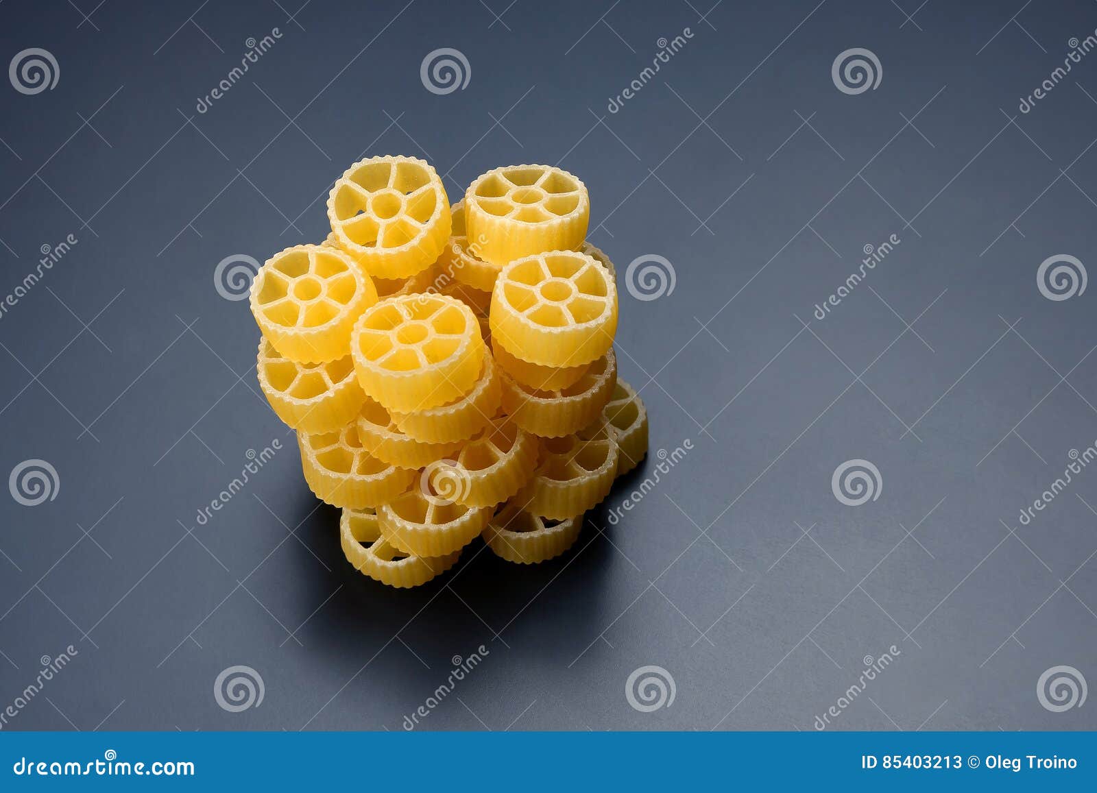 Uncooked Dry Pasta in the Shape of a Wheel Stock Image - Image of ...