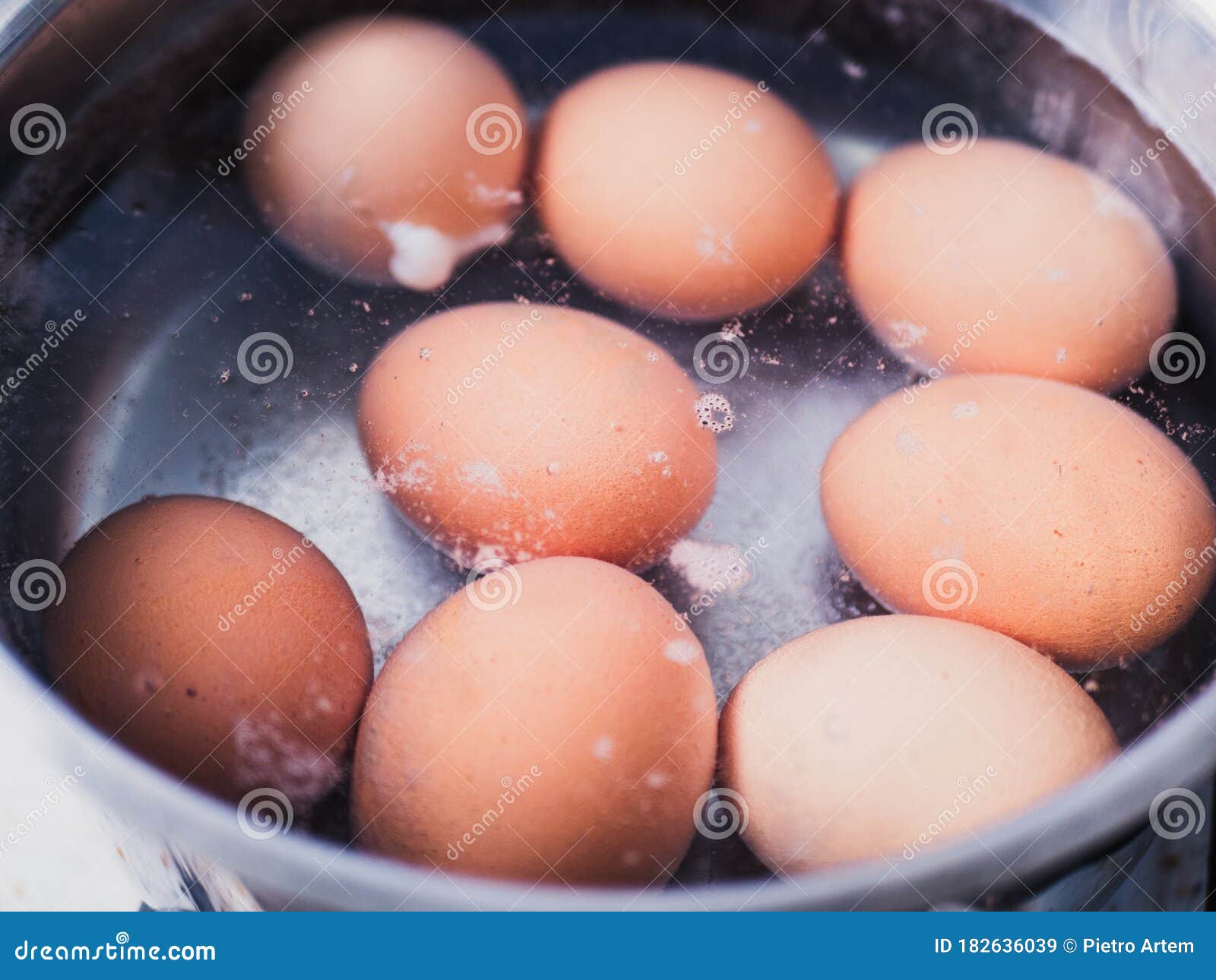 Uncooked Eggs Boiling in Hot Water in a Silver Pan Stock Image - Image ...