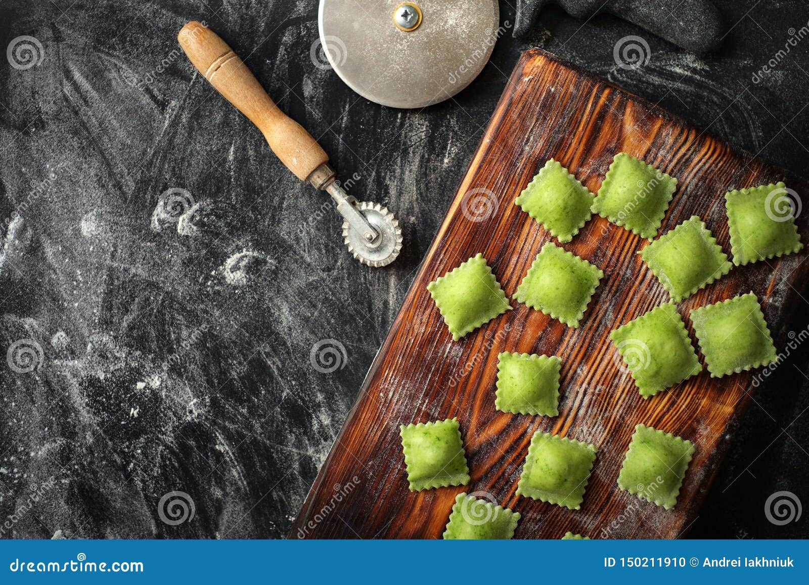 Uncooked Green Organic Ravioli Pasta on Kitchen Table Stock Photo ...