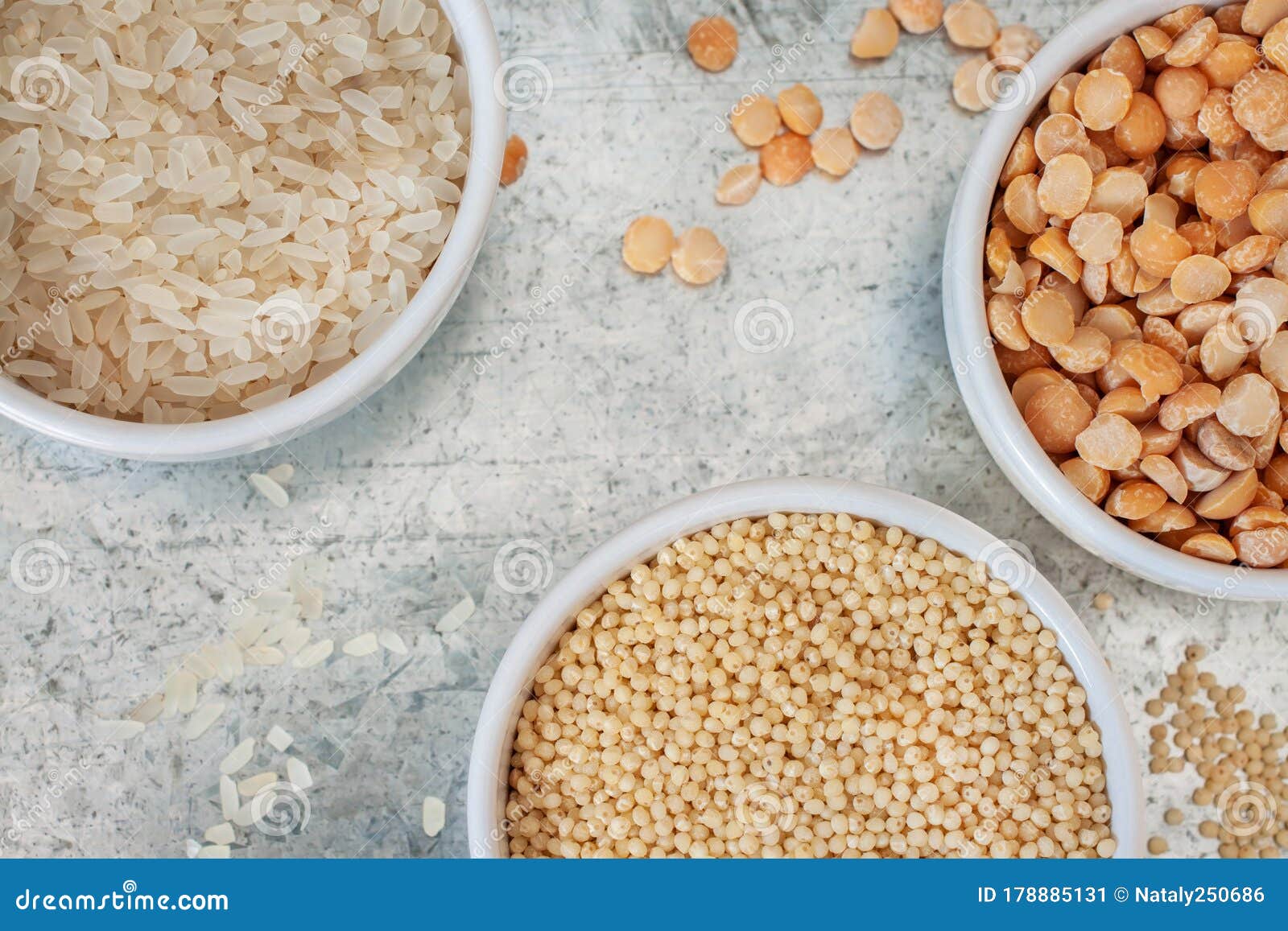 Uncooked Half Peas, Rice And Millet In White Ceramic Bowl Above View On ...
