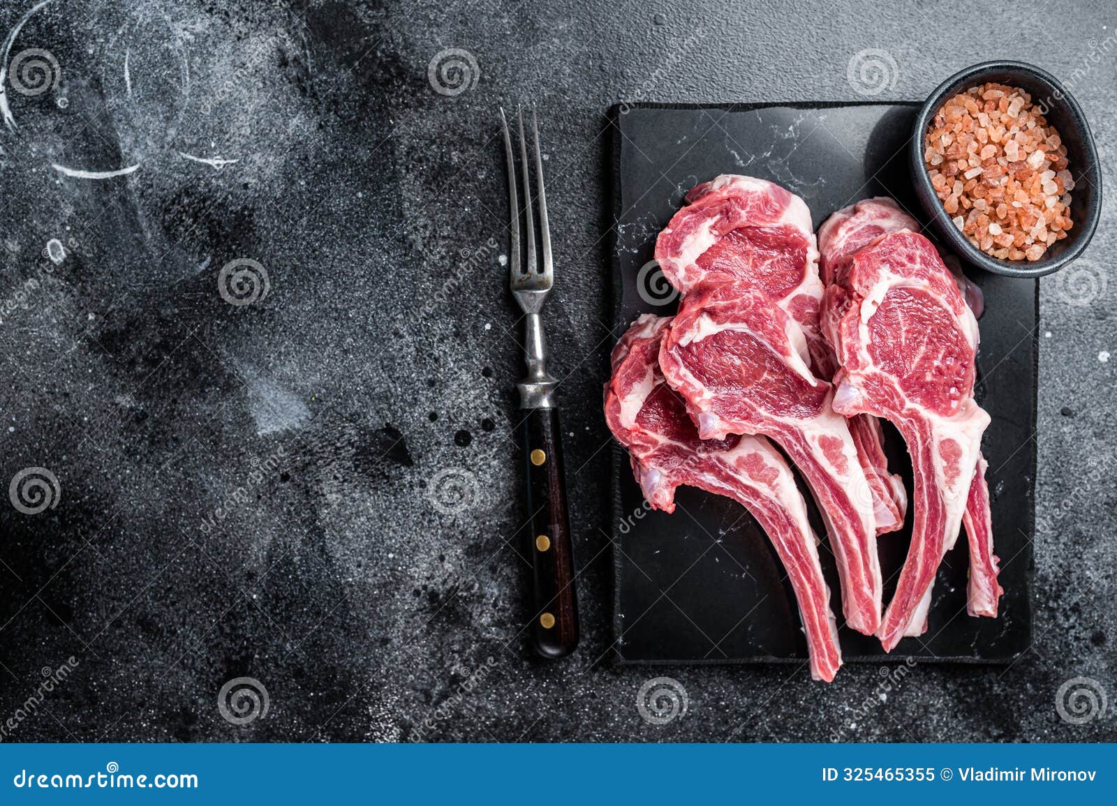 Uncooked Lamb Mutton Chops, Raw Meat Steaks. Black Background. Top View ...