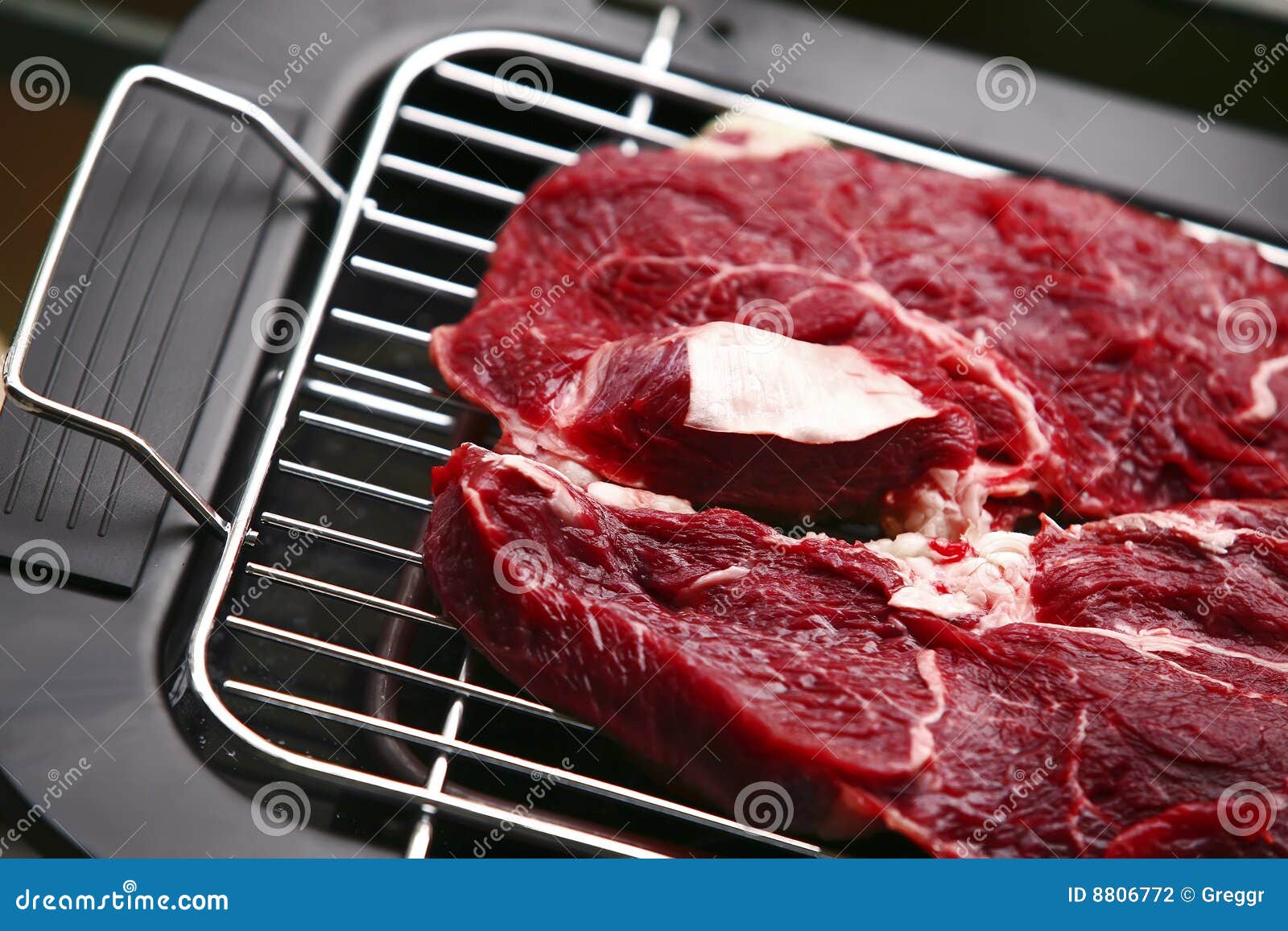 Uncooked meat on bbq stock photo. Image of ingredient - 8806772