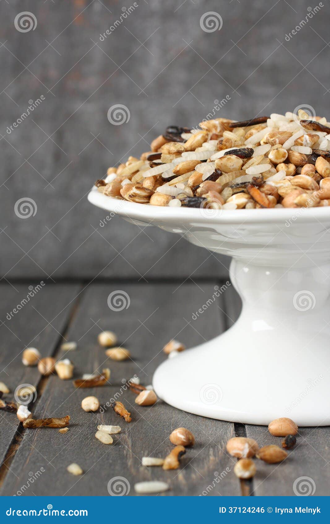 Uncooked Multigrain Rice on White Plate on Wooden Background Stock ...