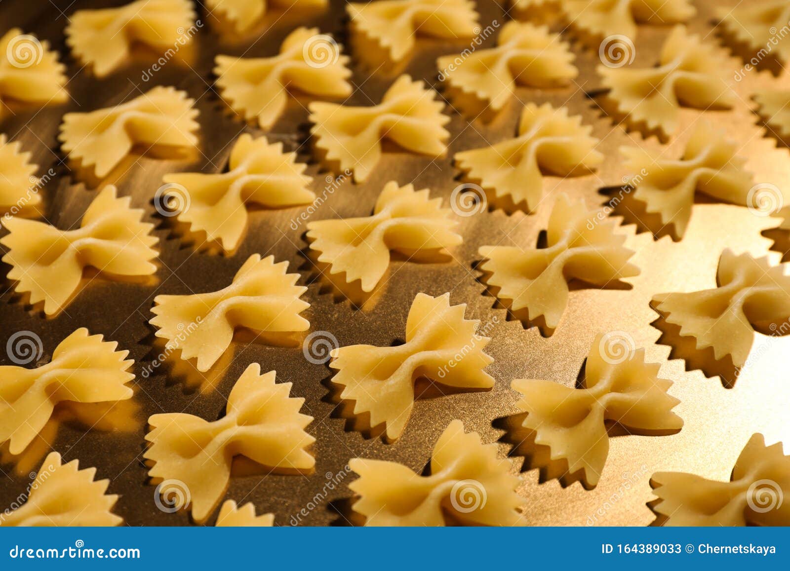 Uncooked Organic Farfalline Pasta on Table, Closeup Stock Image - Image ...