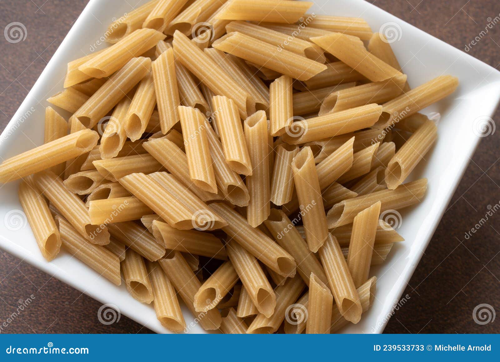 Uncooked Penne Pasta in a Bowl Stock Image - Image of penne, uncooked ...