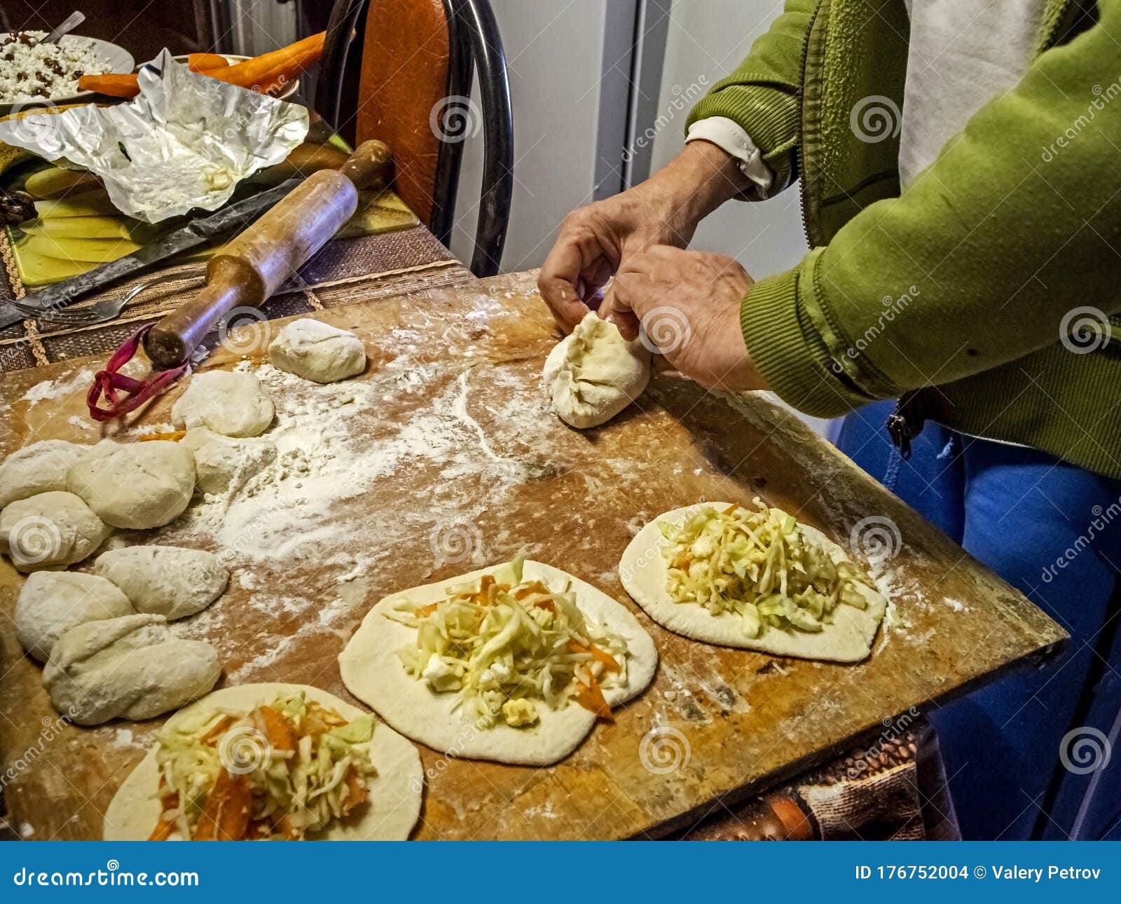 Uncooked Pies, Pinching the Edges of a Pie with a Filling Stock Photo ...
