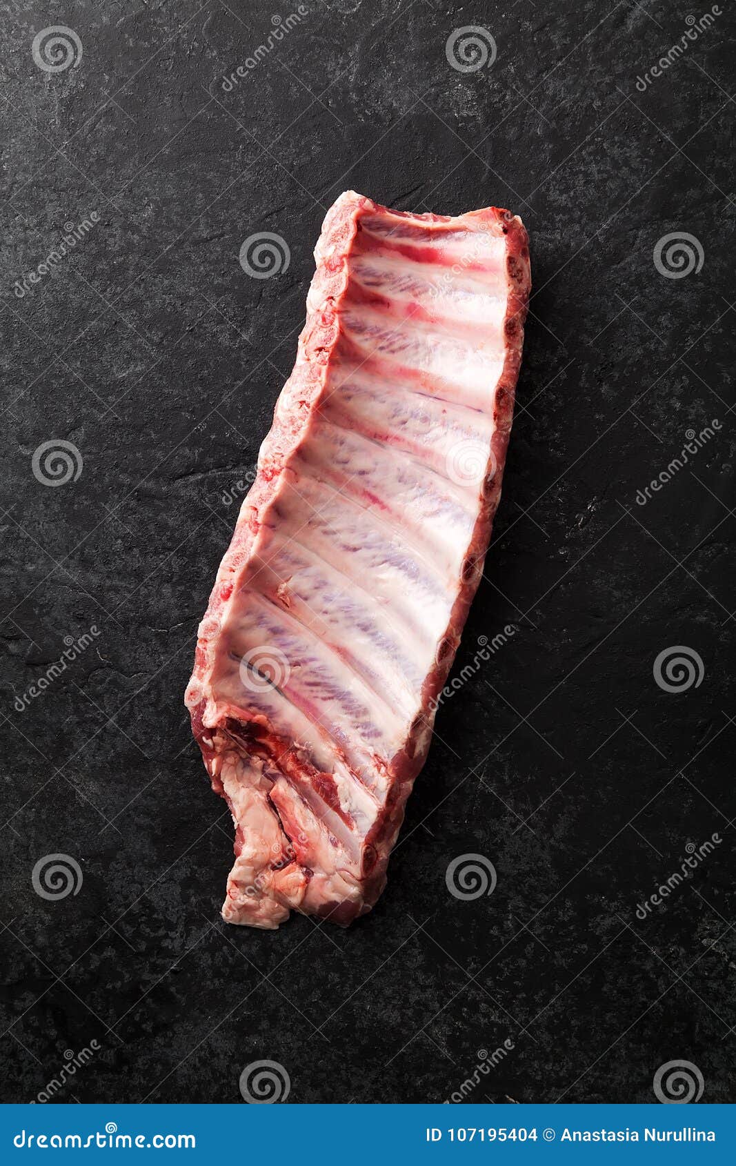 Uncooked Pork Ribs on Dark Textured Background Stock Photo - Image of ...