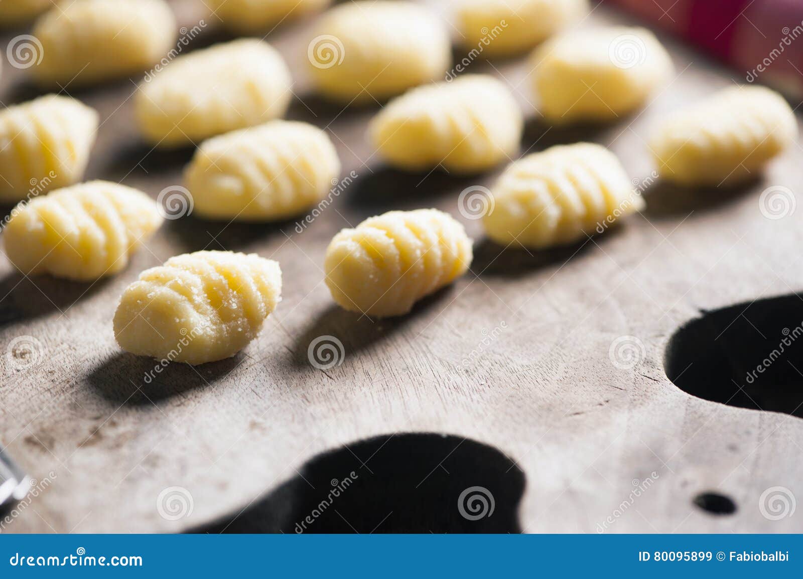 Uncooked potato gnocchi stock image. Image of fresh, strainer - 80095899