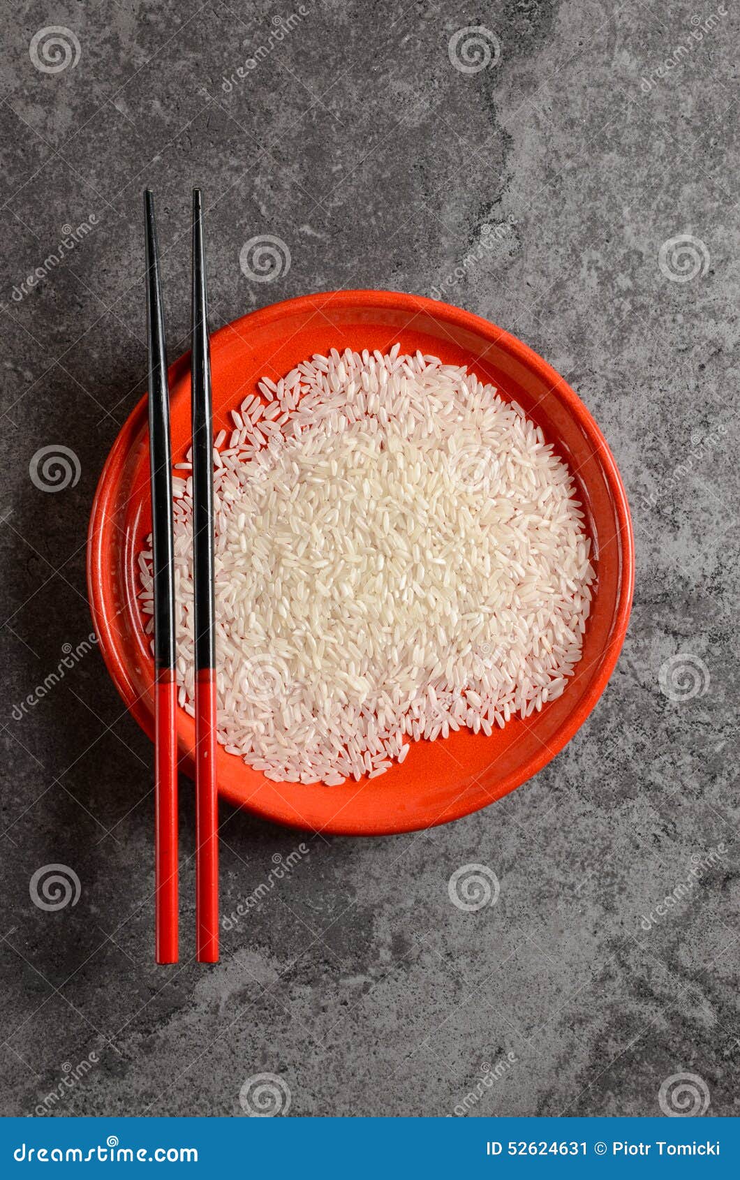 Uncooked rice in a bowl stock image. Image of dietary - 52624631