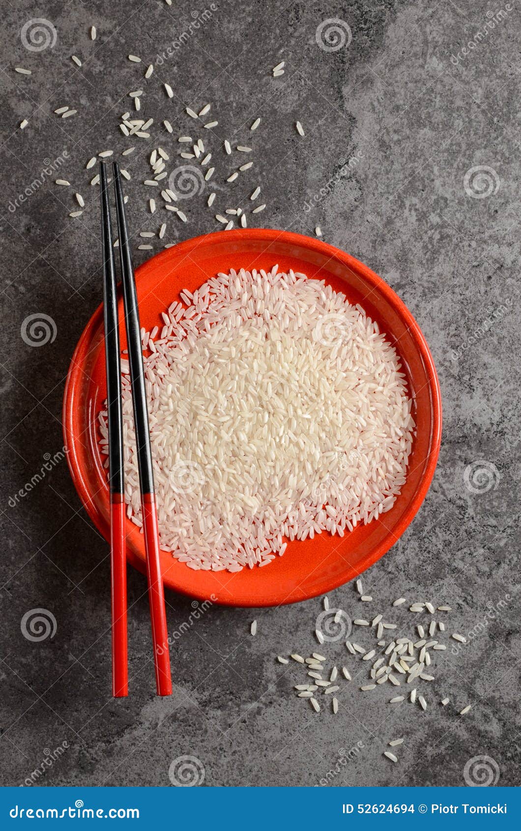 Uncooked rice in a bowl stock photo. Image of texture - 52624694