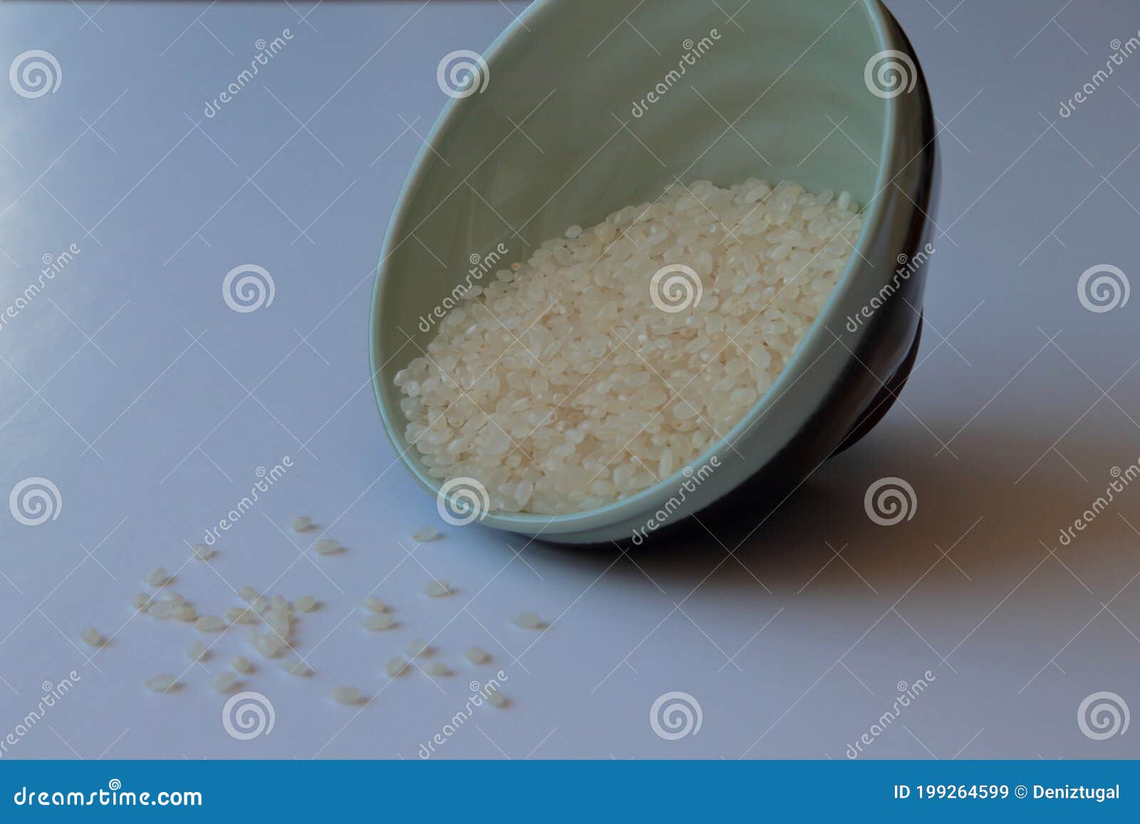 Uncooked Rice in Ceramic Bowl on White Background Stock Image - Image ...