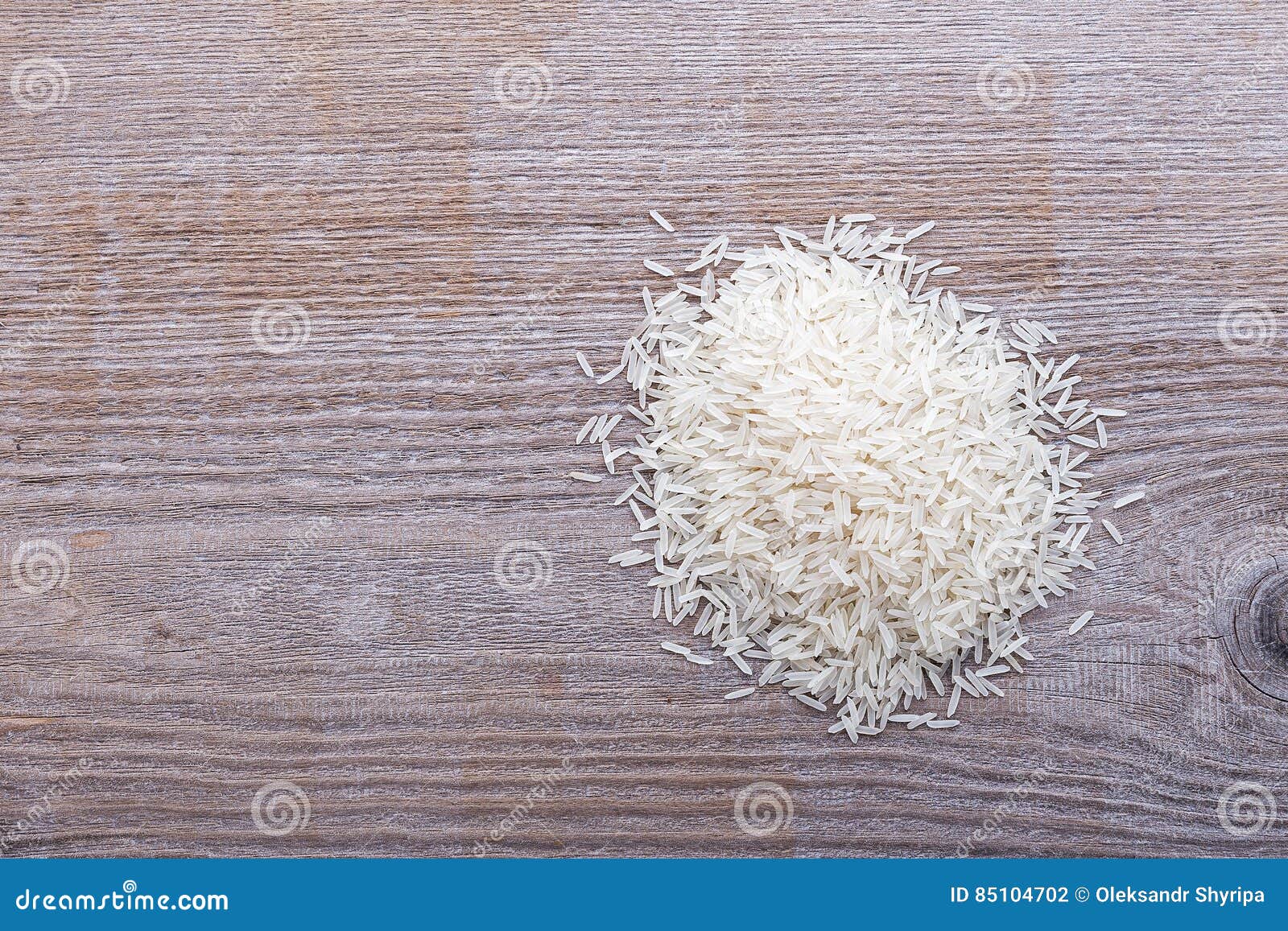 Uncooked rice is scattered stock photo. Image of asian - 85104702