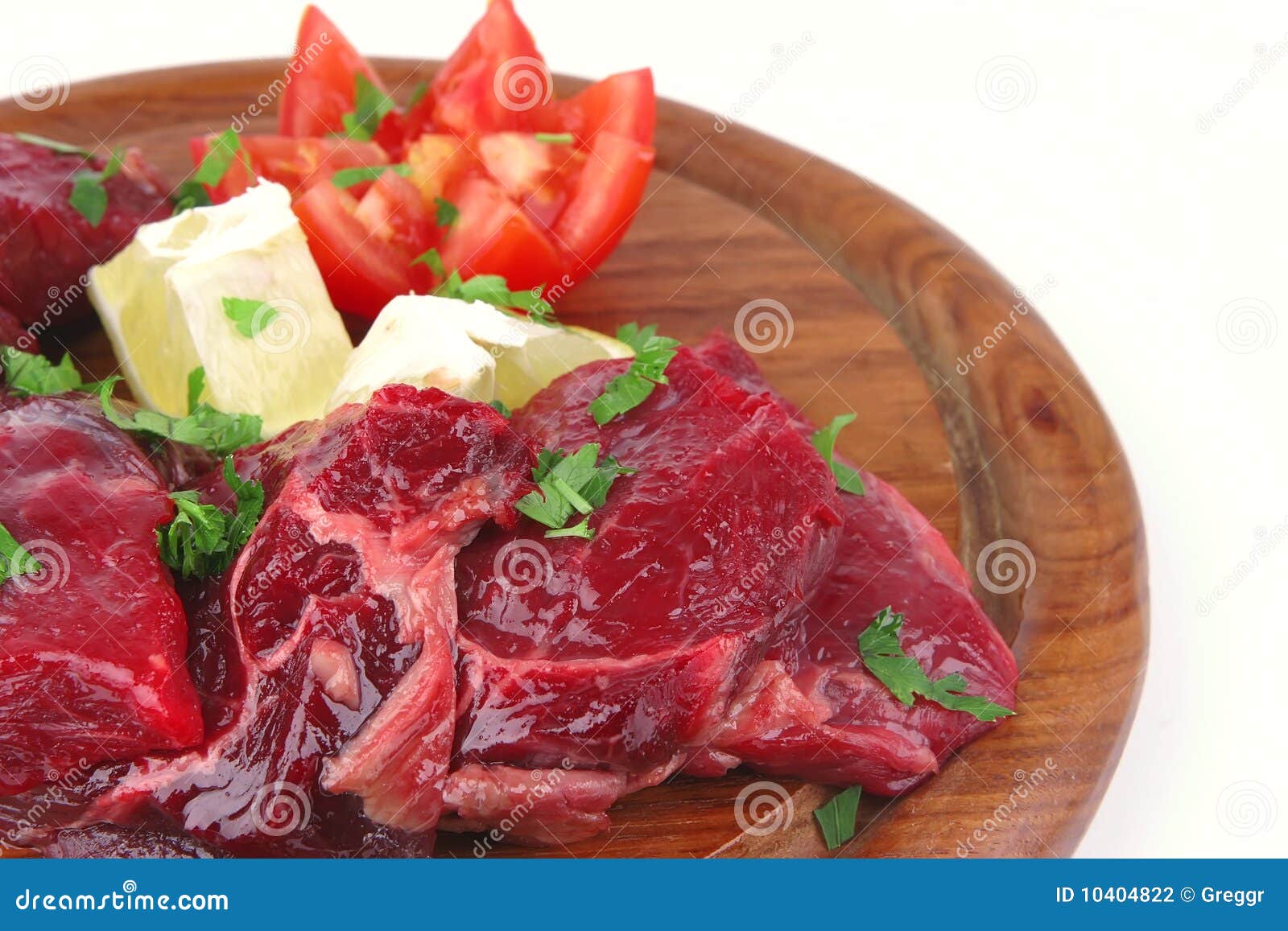 Uncooked small beef chunks stock photo. Image of board - 10404822