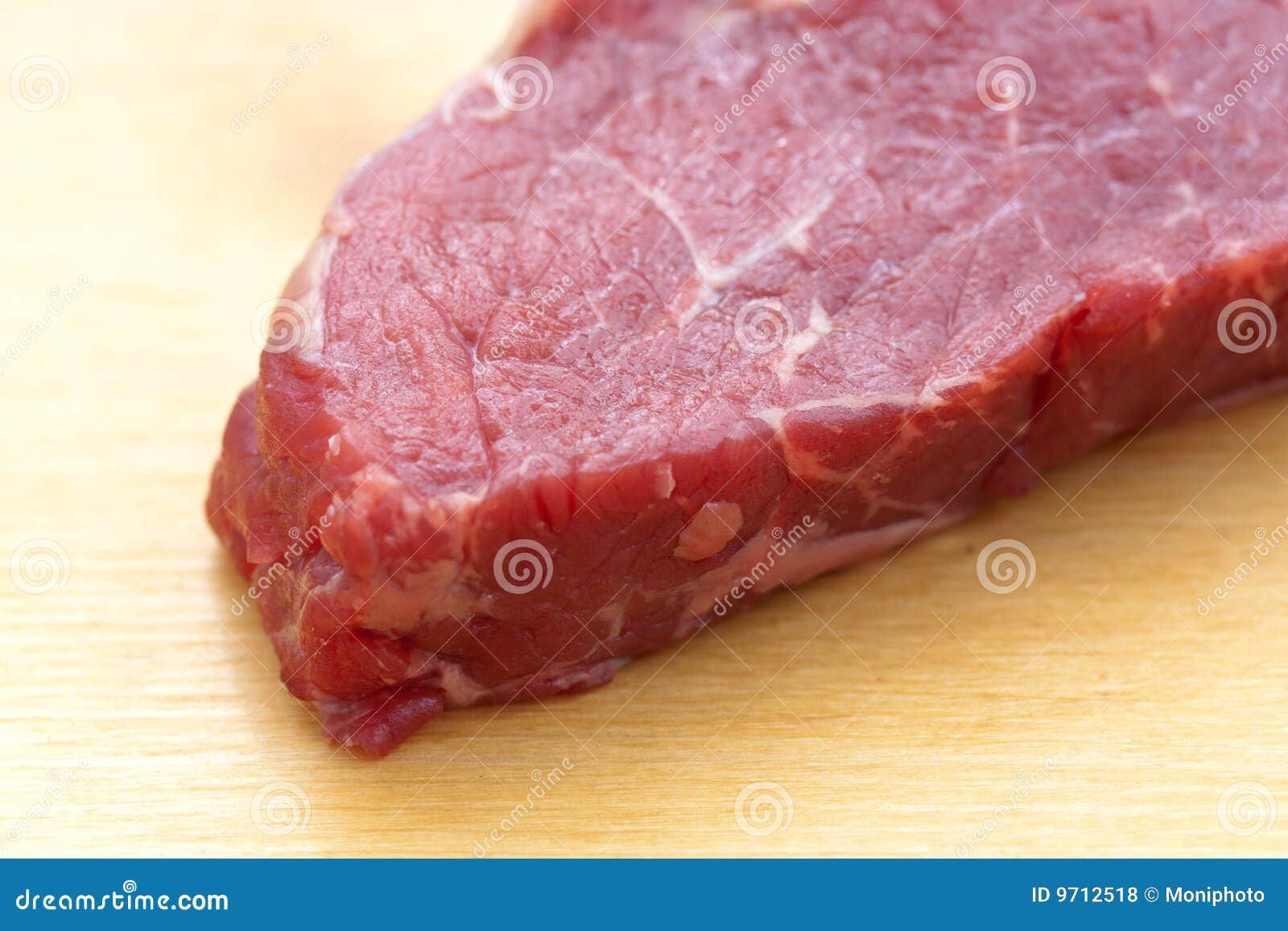 Uncooked Steaks on Wooden Cutting Board Stock Photo - Image of ...