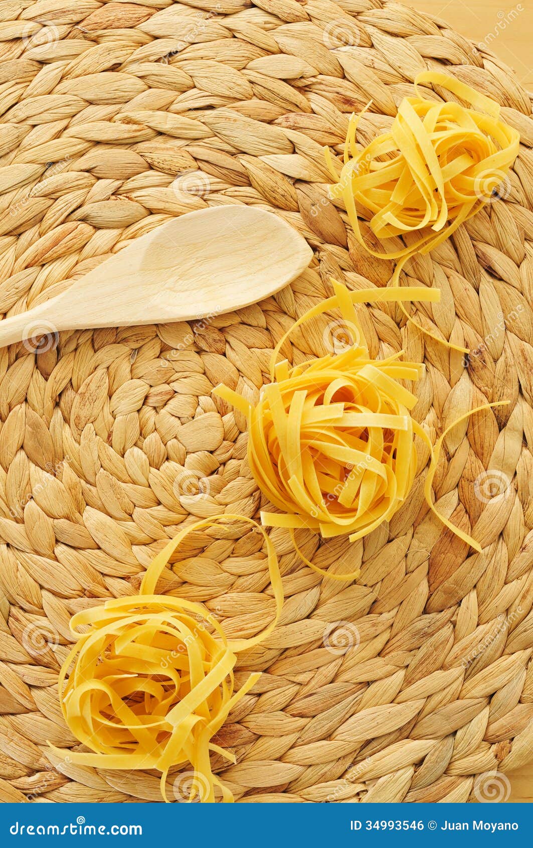 Uncooked tagliatelle stock photo. Image of table, nest - 34993546