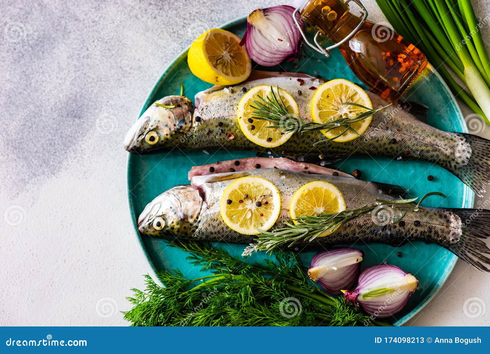 Uncooked trout fish stock image. Image of green, table - 174098213