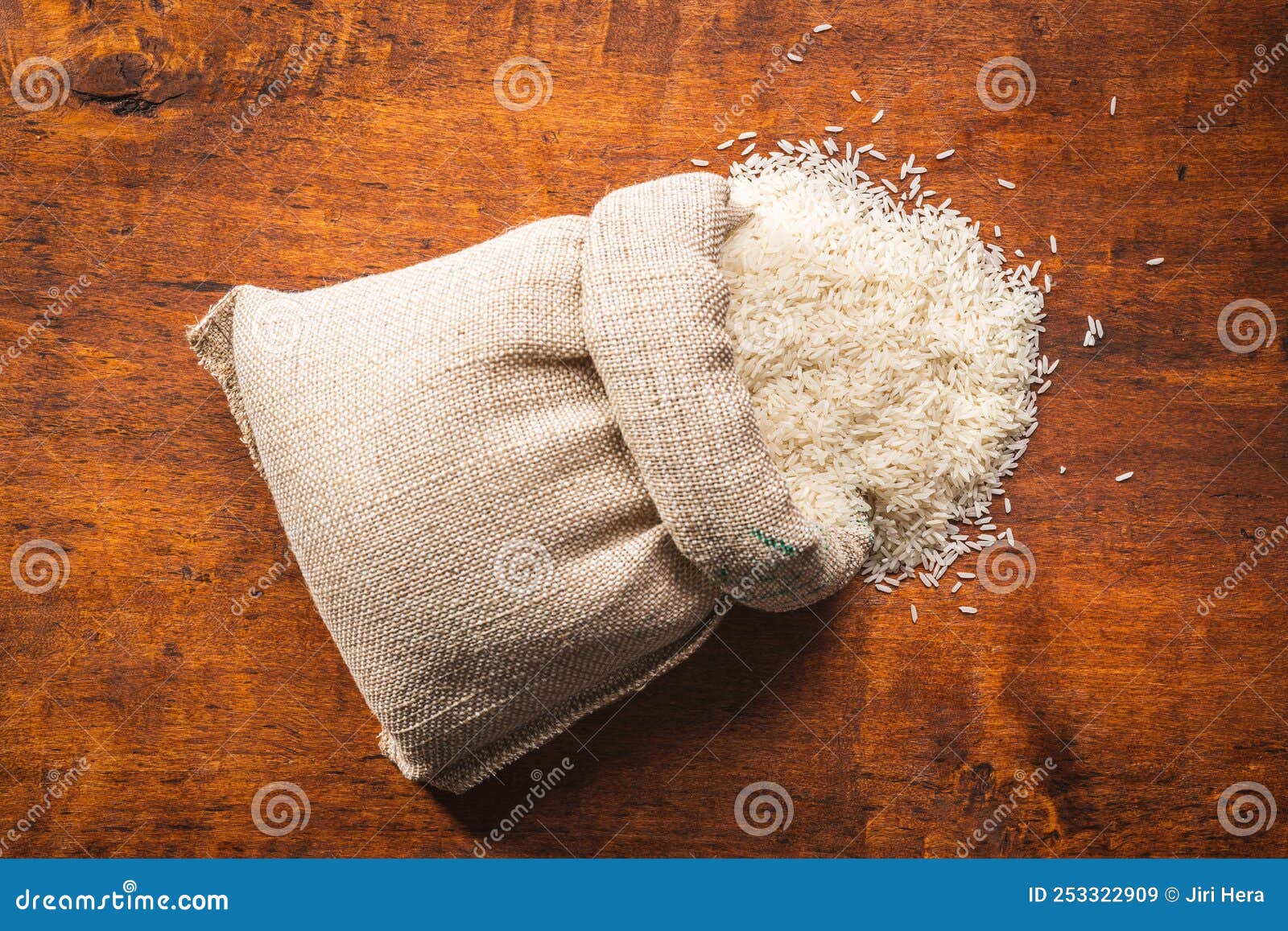 Uncooked White Rice in Burlap Sack on Wooden Table Stock Image - Image ...