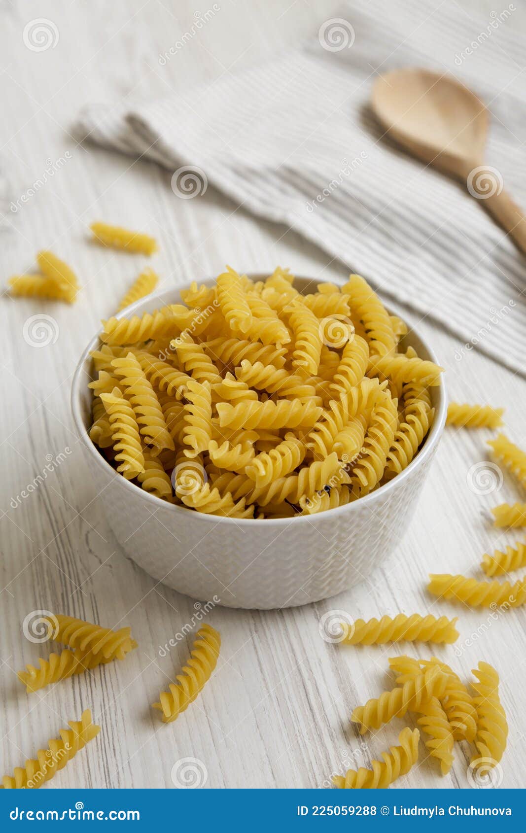 Uncooked Yellow Organic Rotini Pasta, Side View Stock Photo - Image of ...
