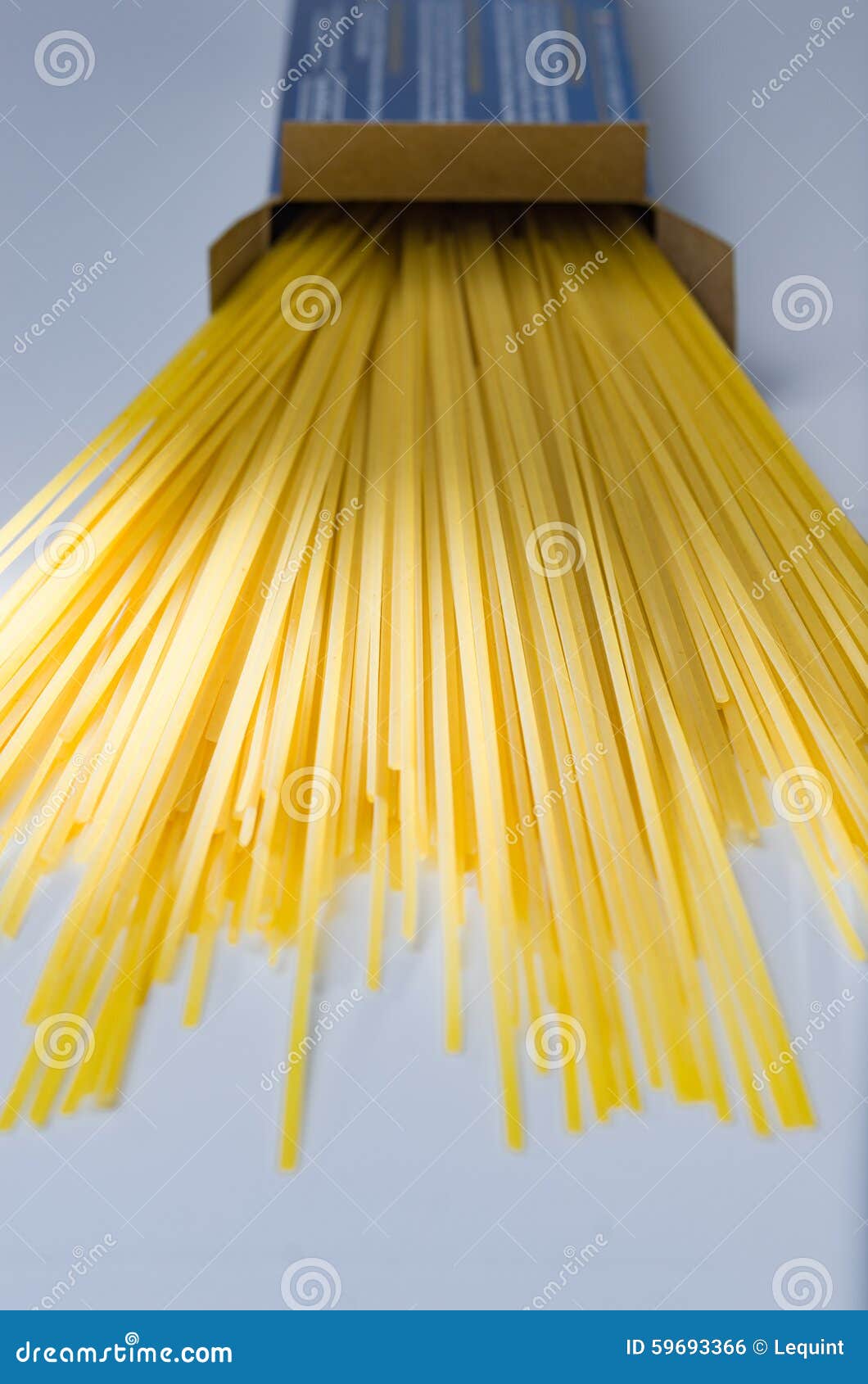 Uncooked Yellow Spaghetti in Box Stock Photo - Image of fine, flour ...