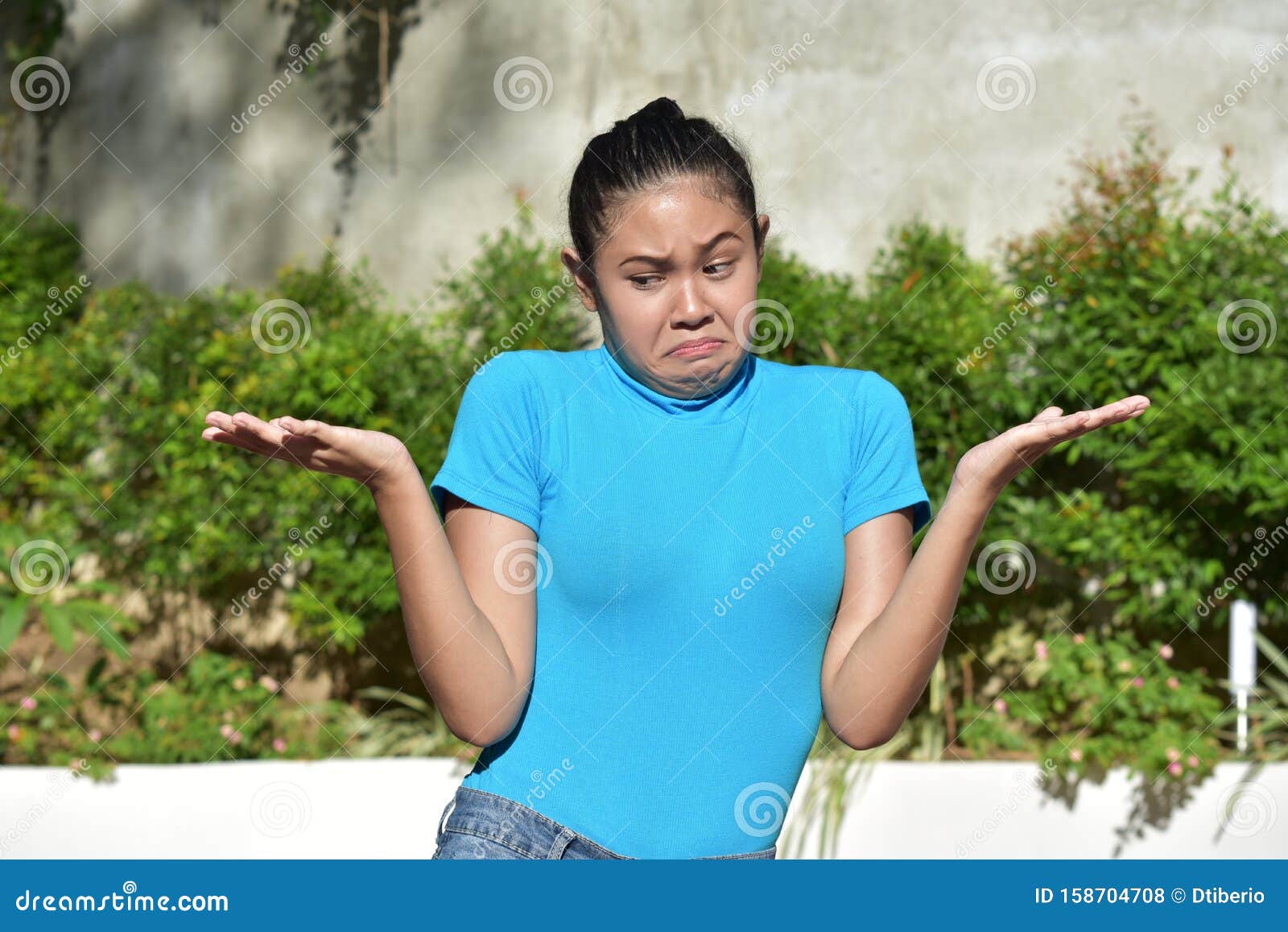 An Undecided Beautiful Asian Person Stock Photo - Image of looking ...