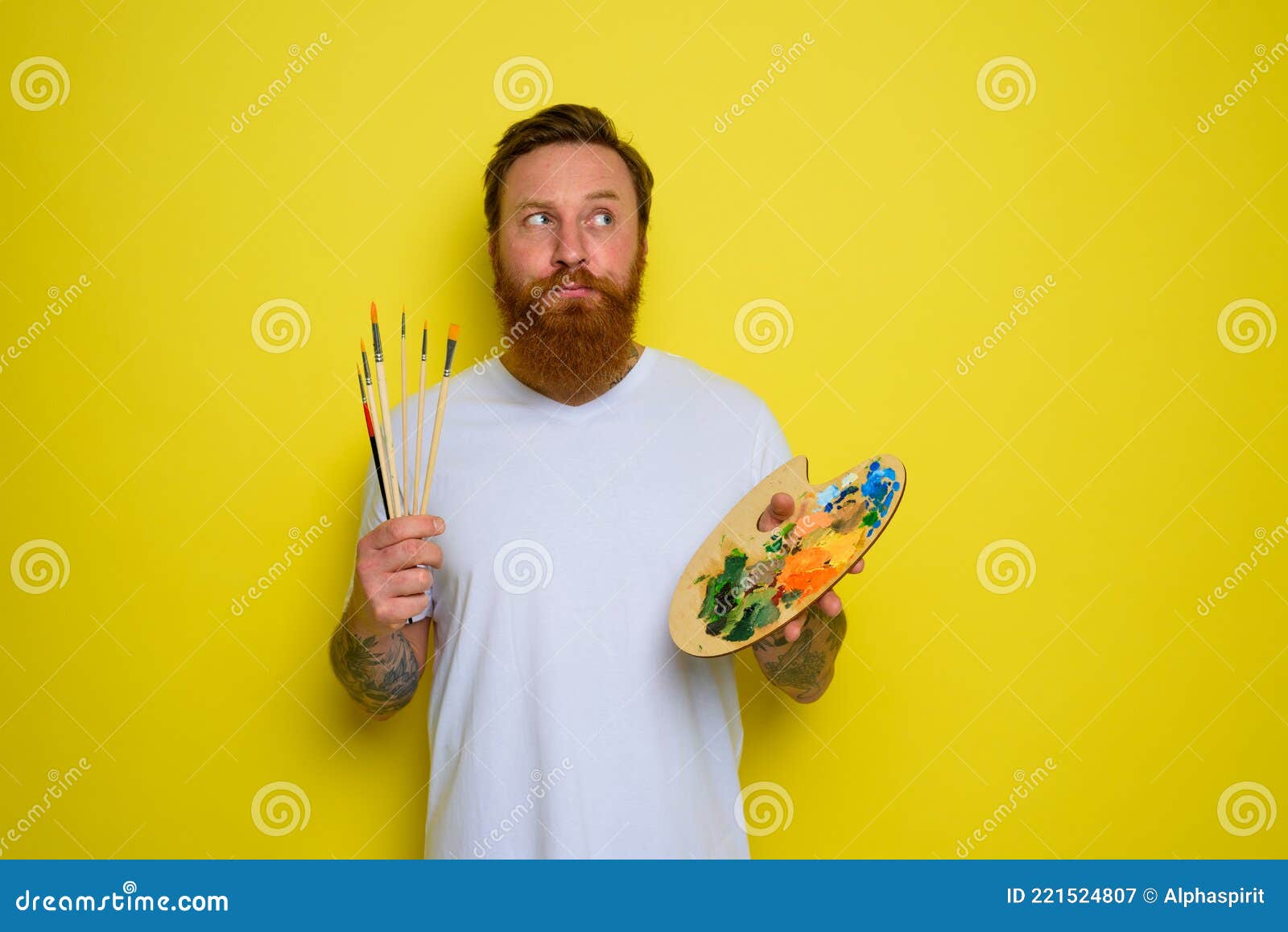 Undecided Man with Beard and Tattoo is Ready To Draw with Brushes Stock ...