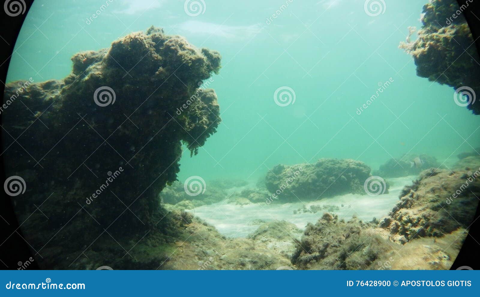 Under the blue see rock stock photo. Image of rock, blue - 76428900