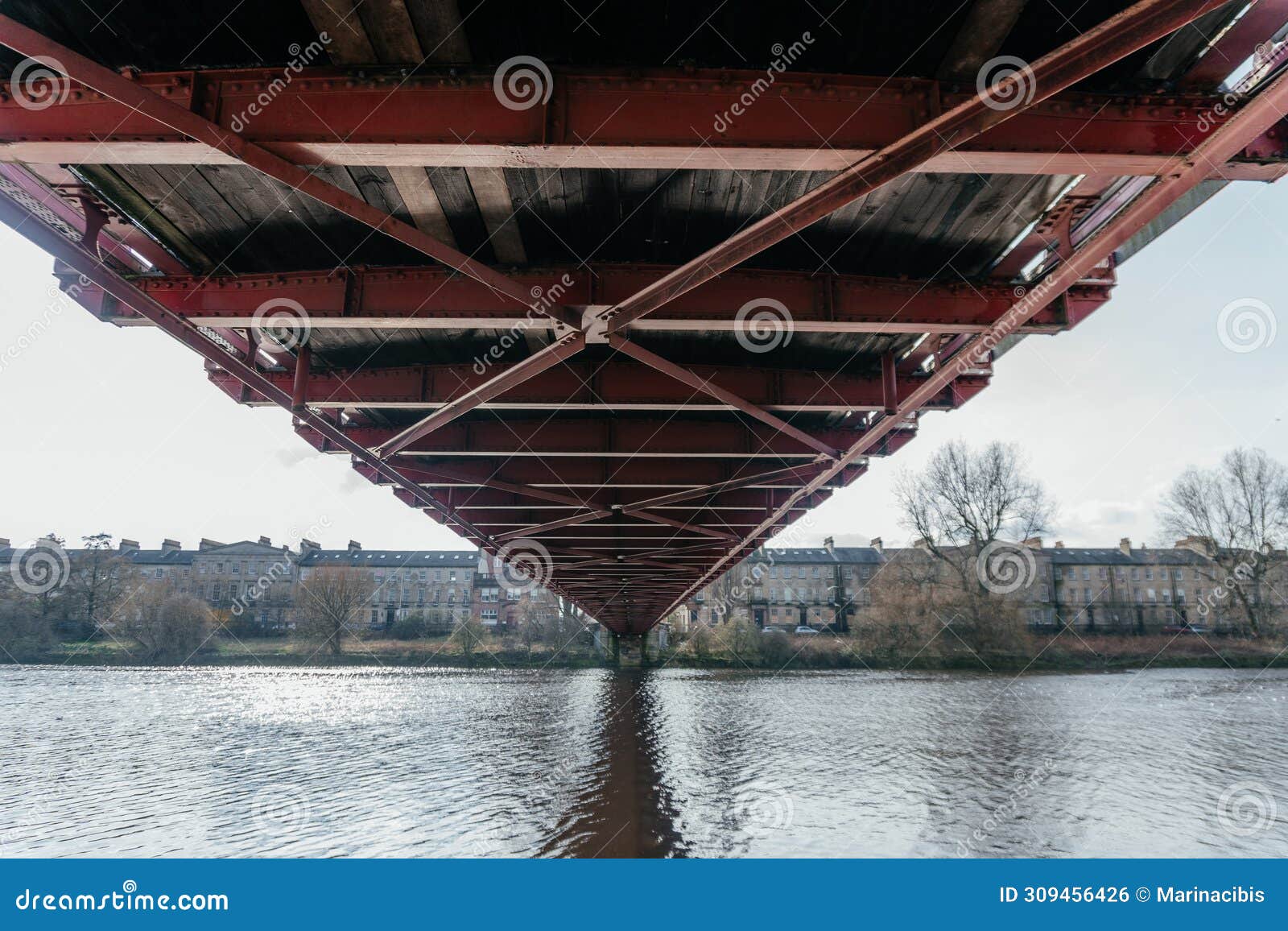 Under the Bridge: Architectural Perspective of Ironwork Over River ...