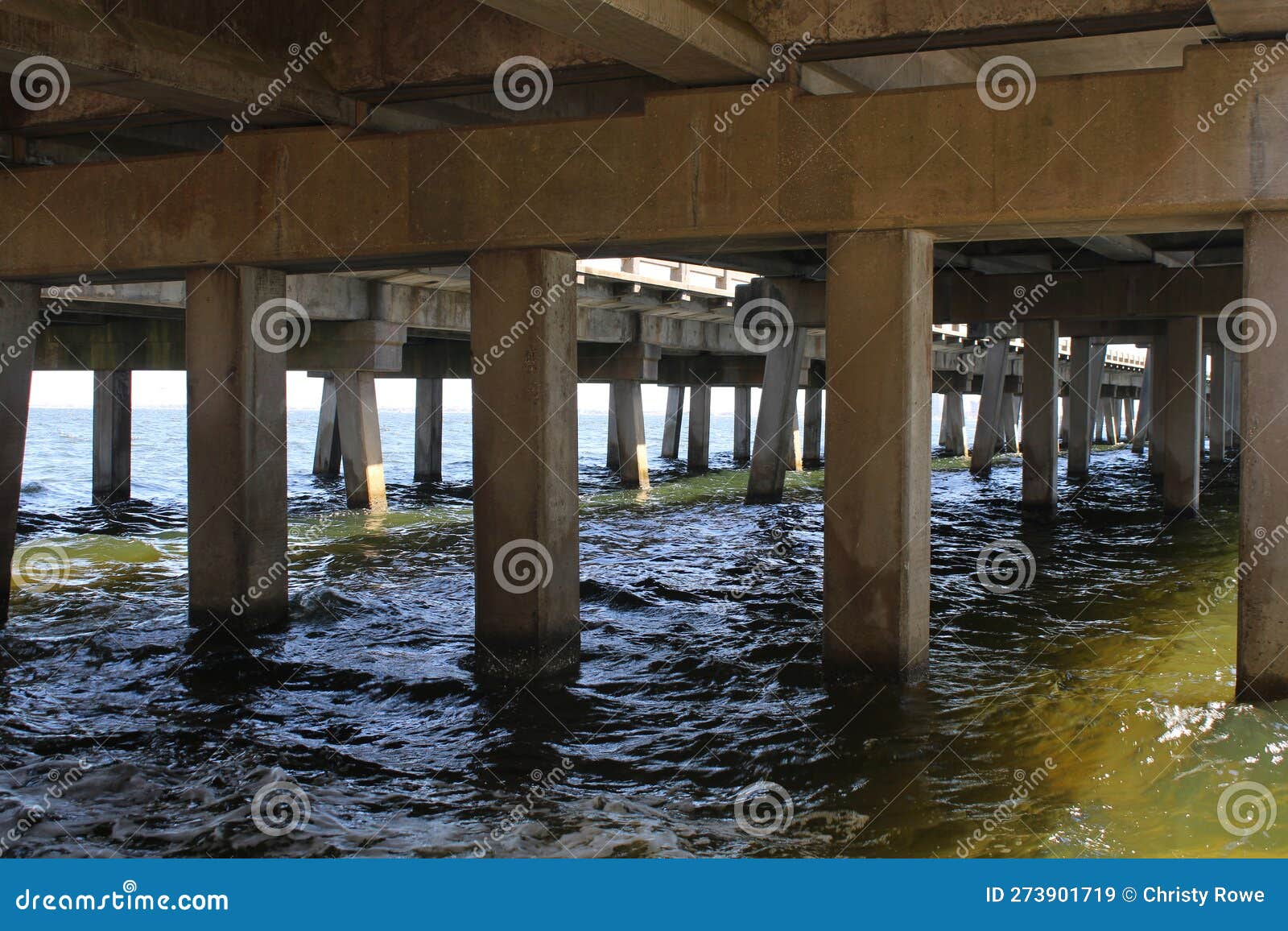 Under a Bridge that is Over Water. Stock Image - Image of bridge ...