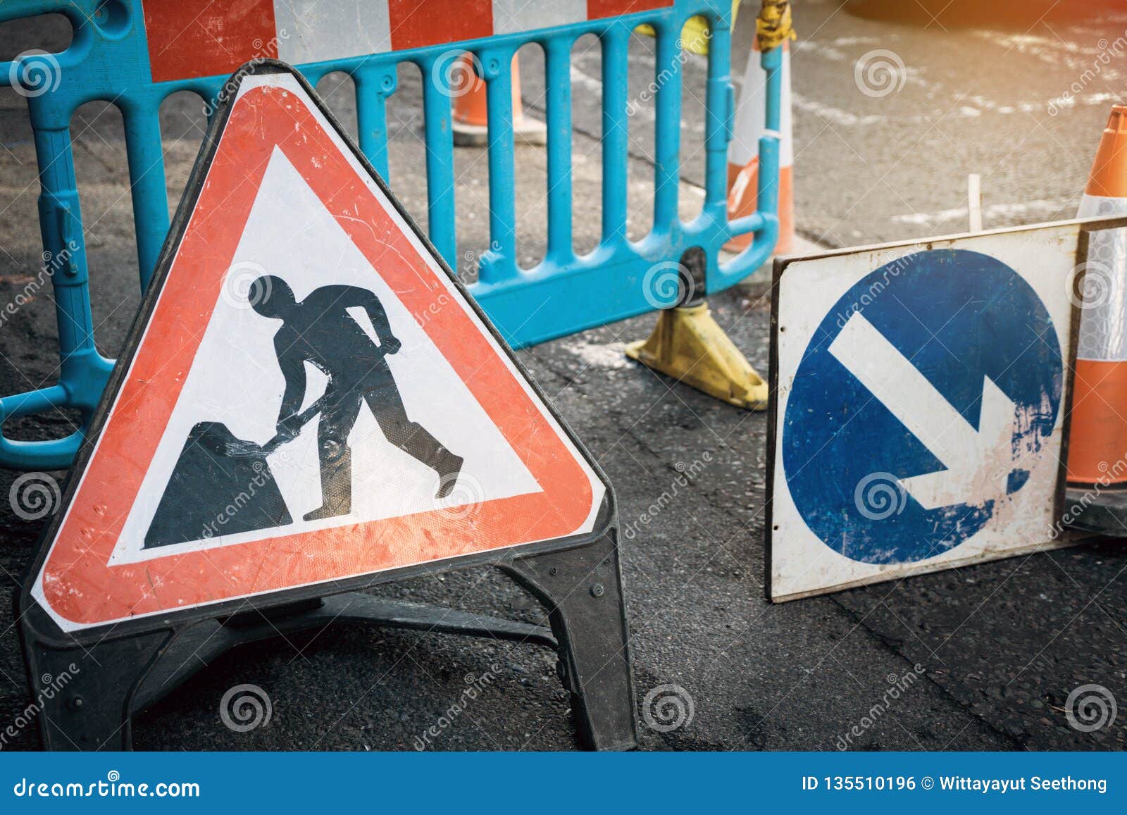 Under Construction Board Sign on the Closed Road with Arrow Sign and ...
