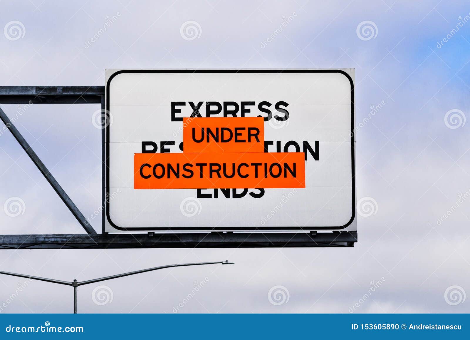 Under Construction `Express Restriction Ends` Sign Posted on a Freeway ...