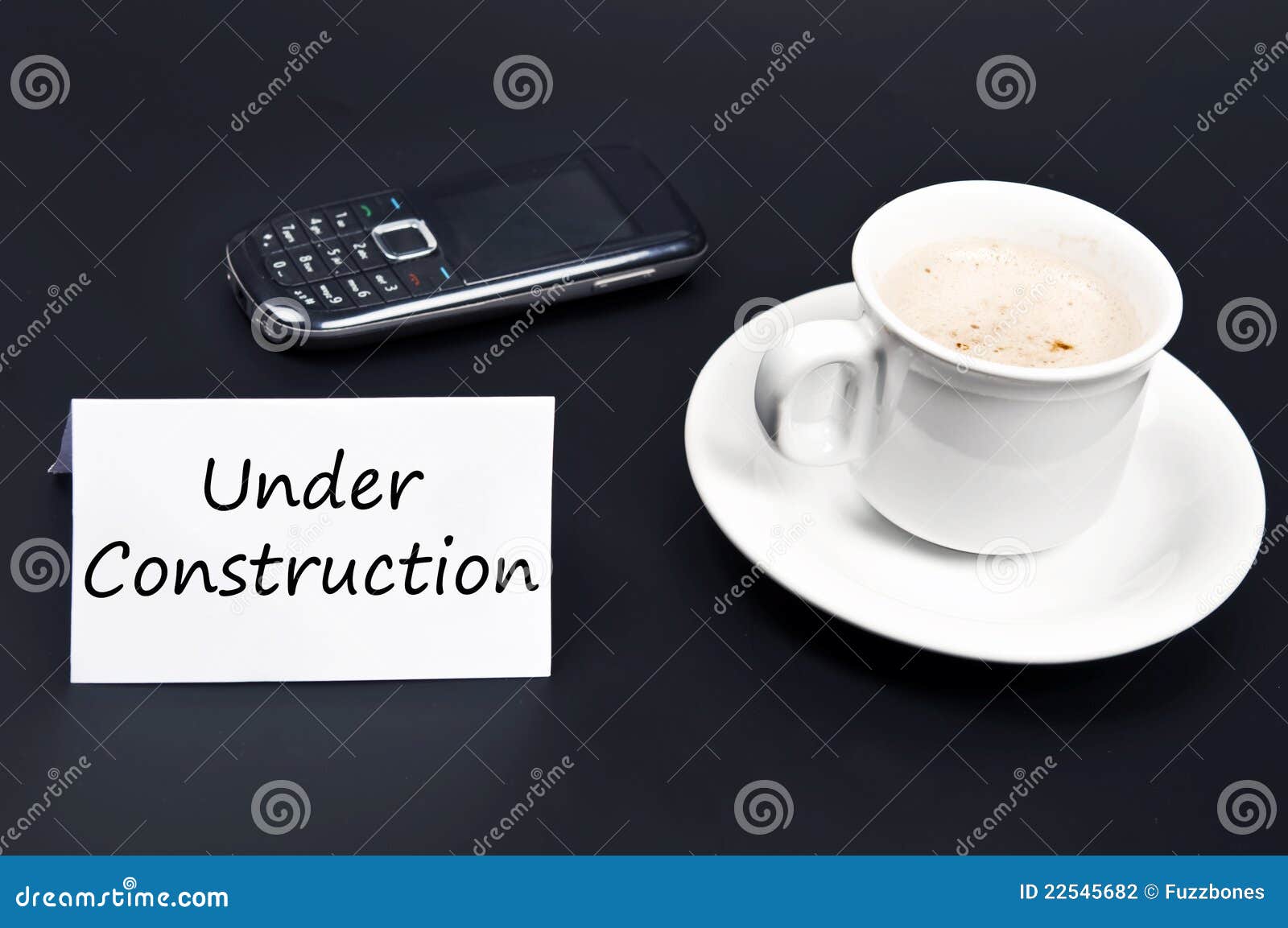 Under Construction Message on Desk with Coffee Stock Photo - Image of ...