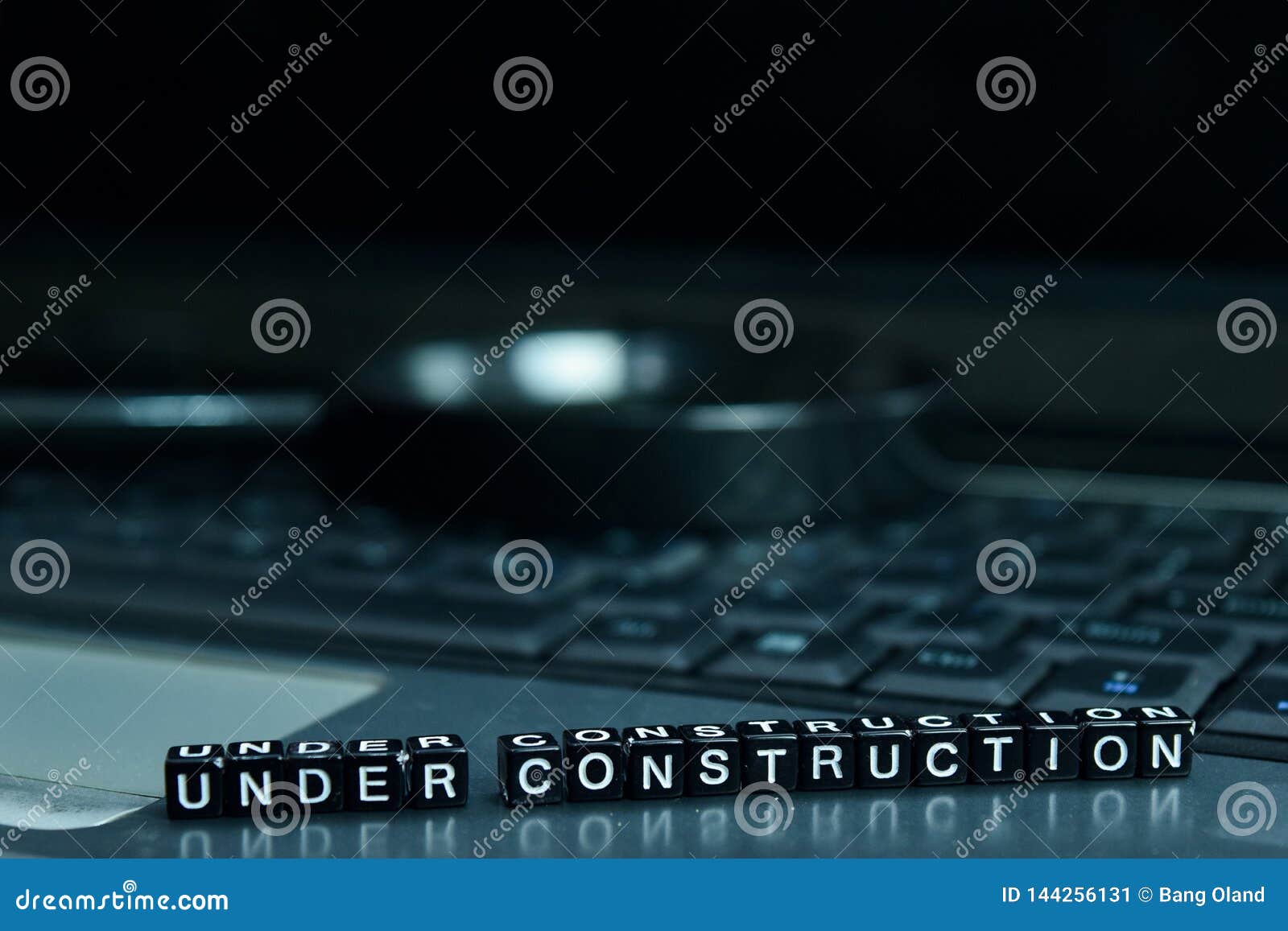 Under Construction Text Wooden Blocks in Laptop Background. Business ...