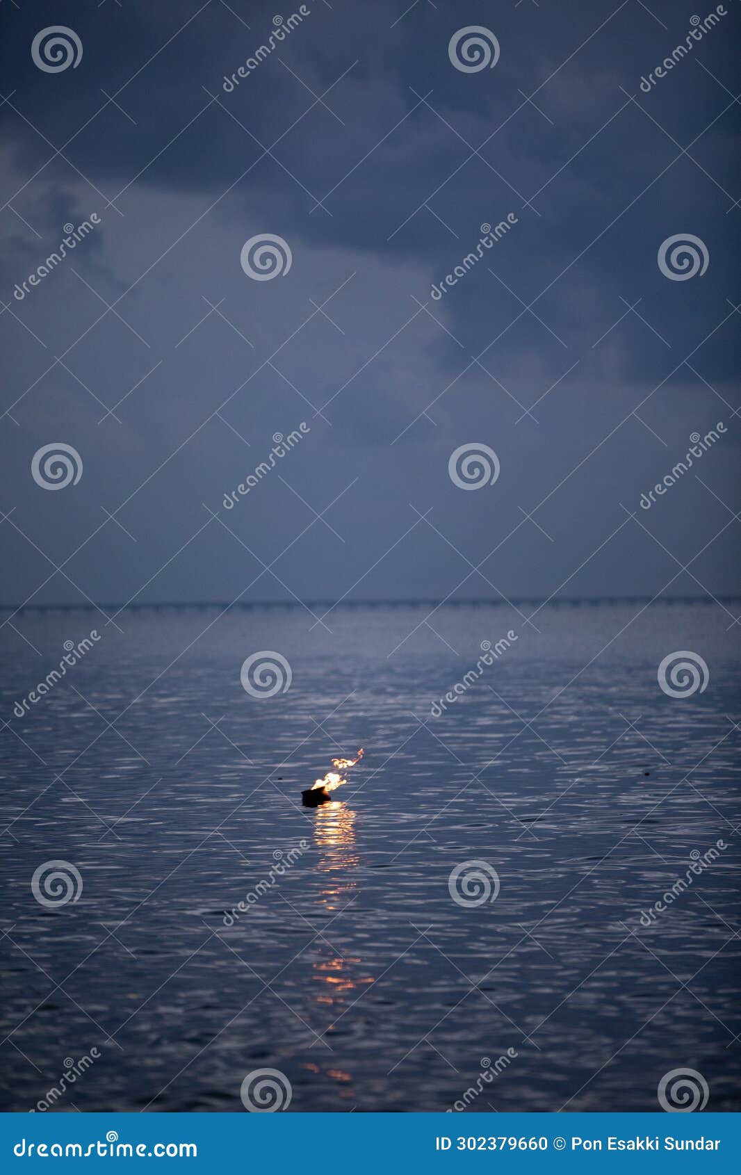 Sky Burning Fire Floating on the Water Stock Photo - Image of beautiful ...