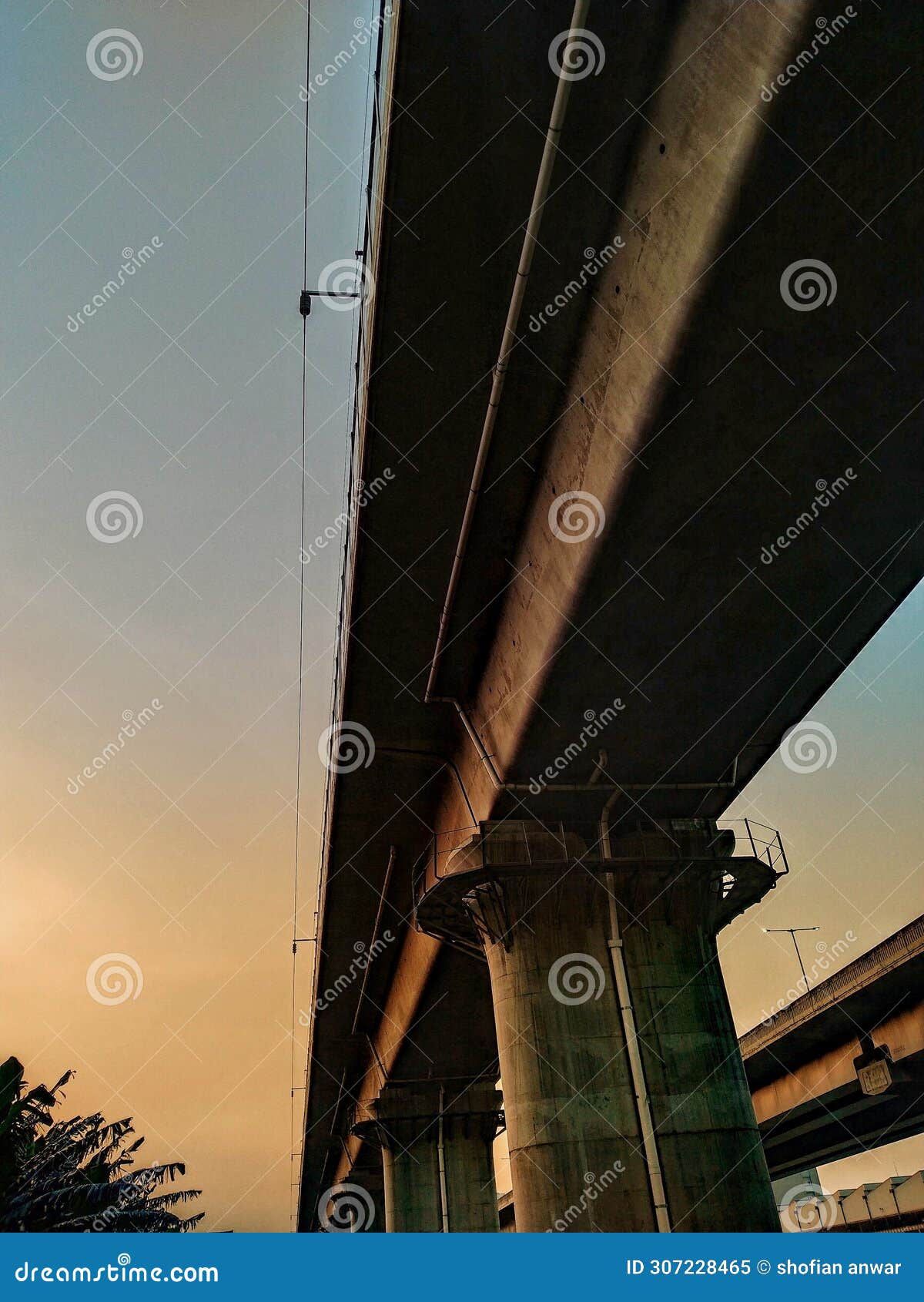 Under the LRT Bridge in the Afternoon Stock Image - Image of sunset ...