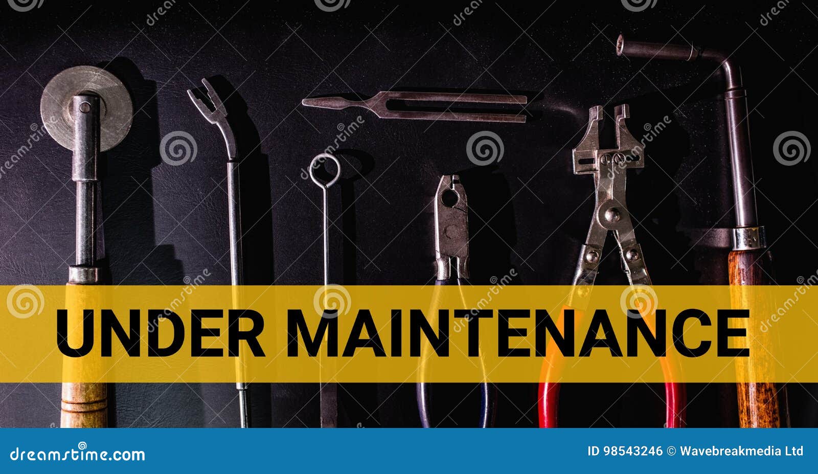 Under Maintenance Text Against Tools Photo Stock Photo - Image of ...