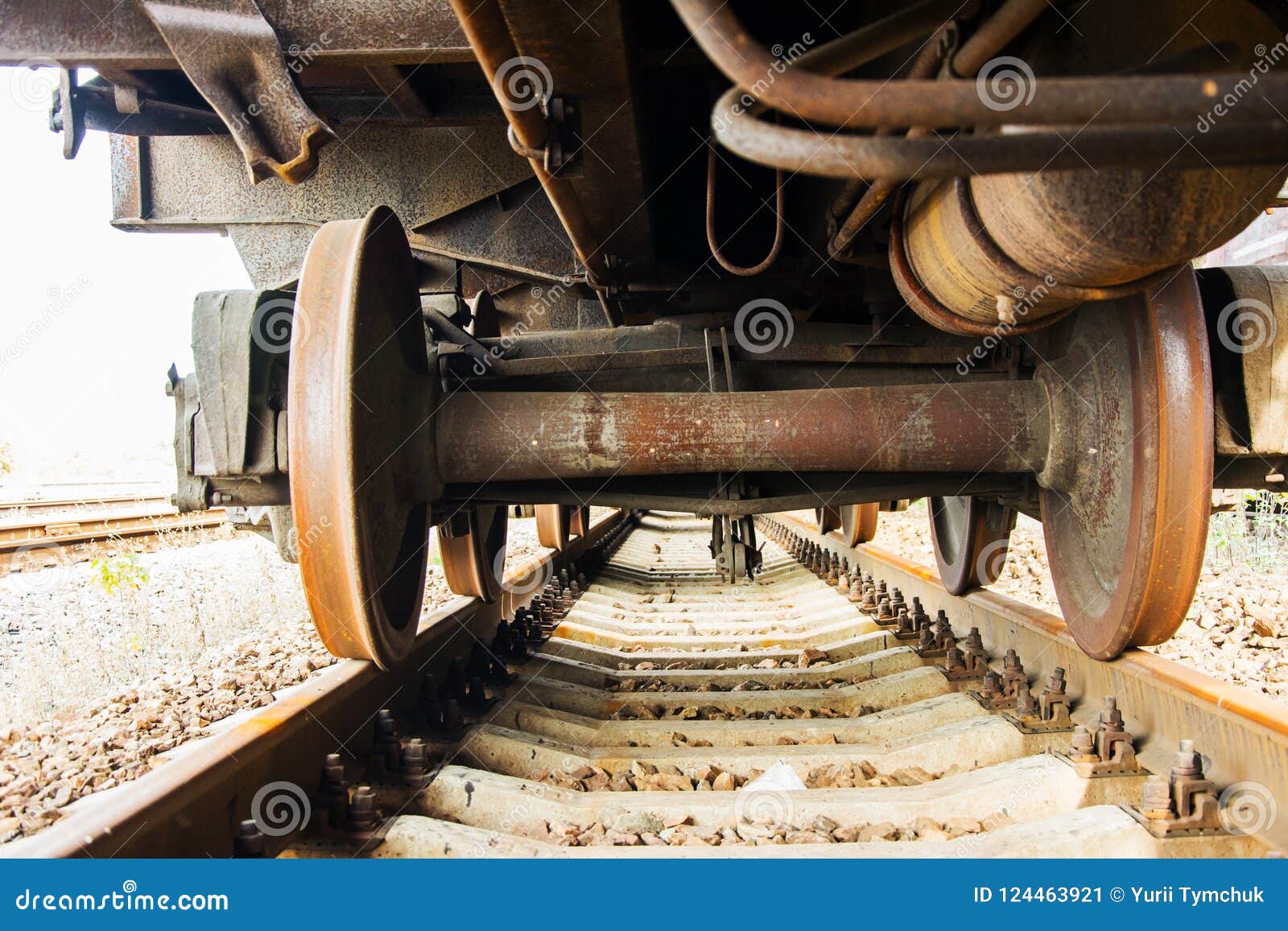 Under of an Old Freight Train on the Railway Tracks. Rusty Wagon Stock ...