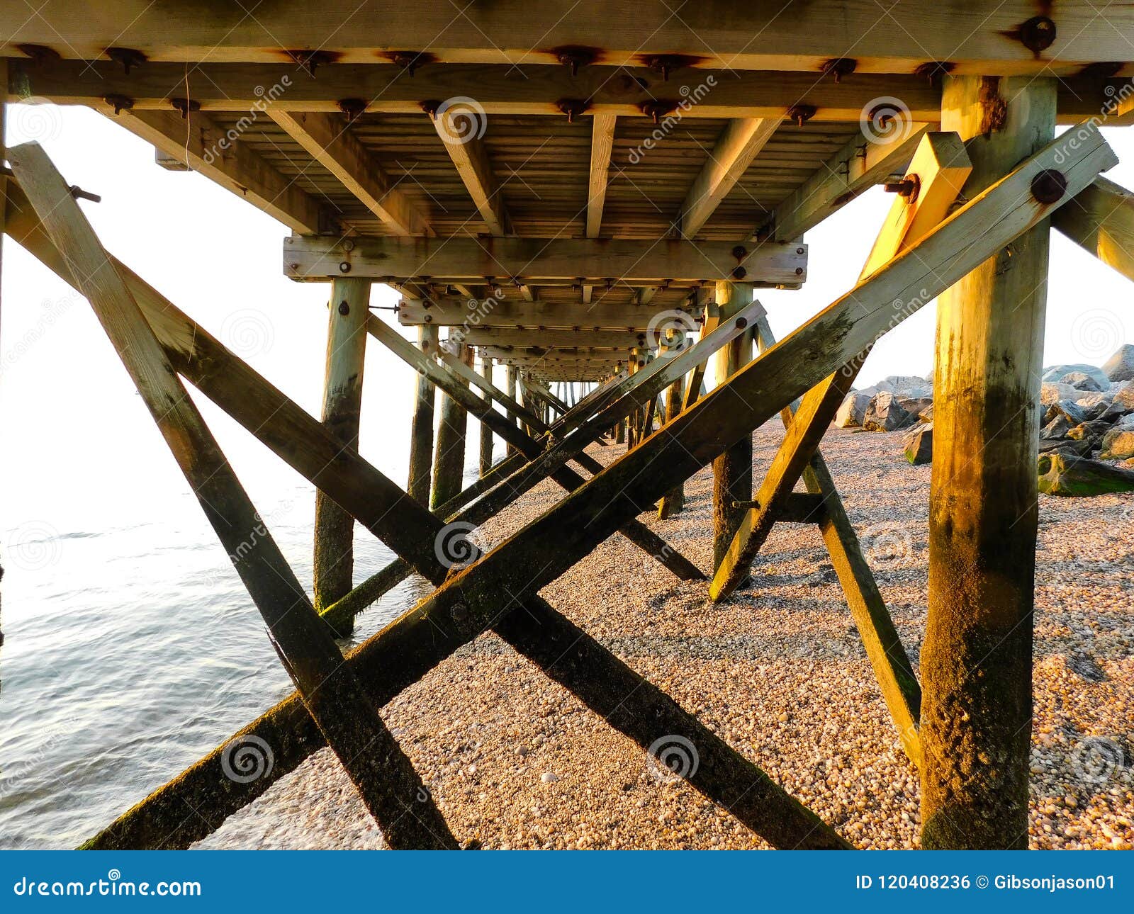 Under the Pier at the Beach Stock Photo - Image of wooden, sand: 120408236