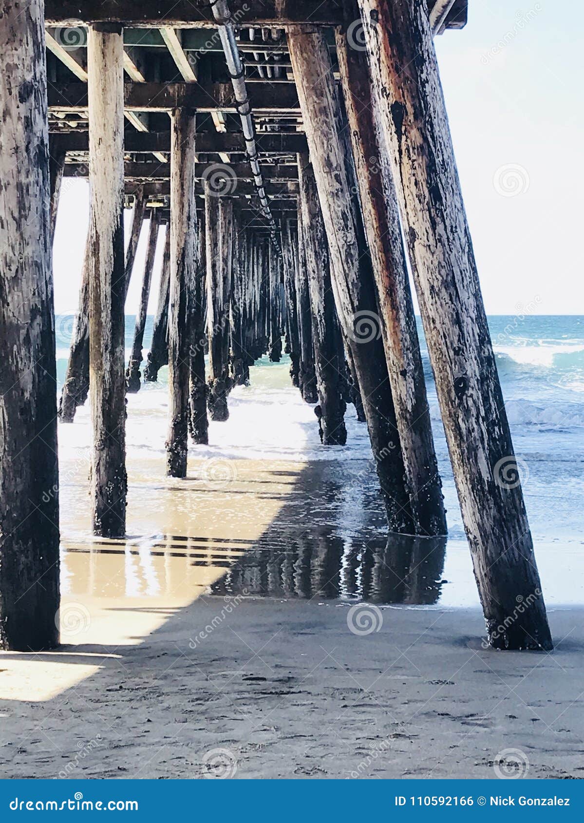 Under the pier stock photo. Image of beach, shot, pier - 110592166