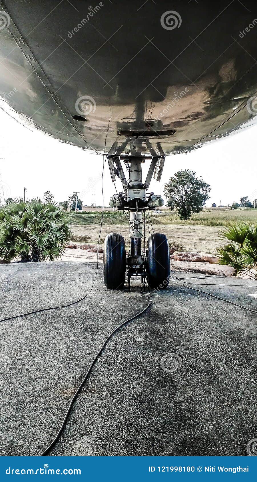 Under the Plane, the Passenger Plane in the Middle of the Field. Stock ...