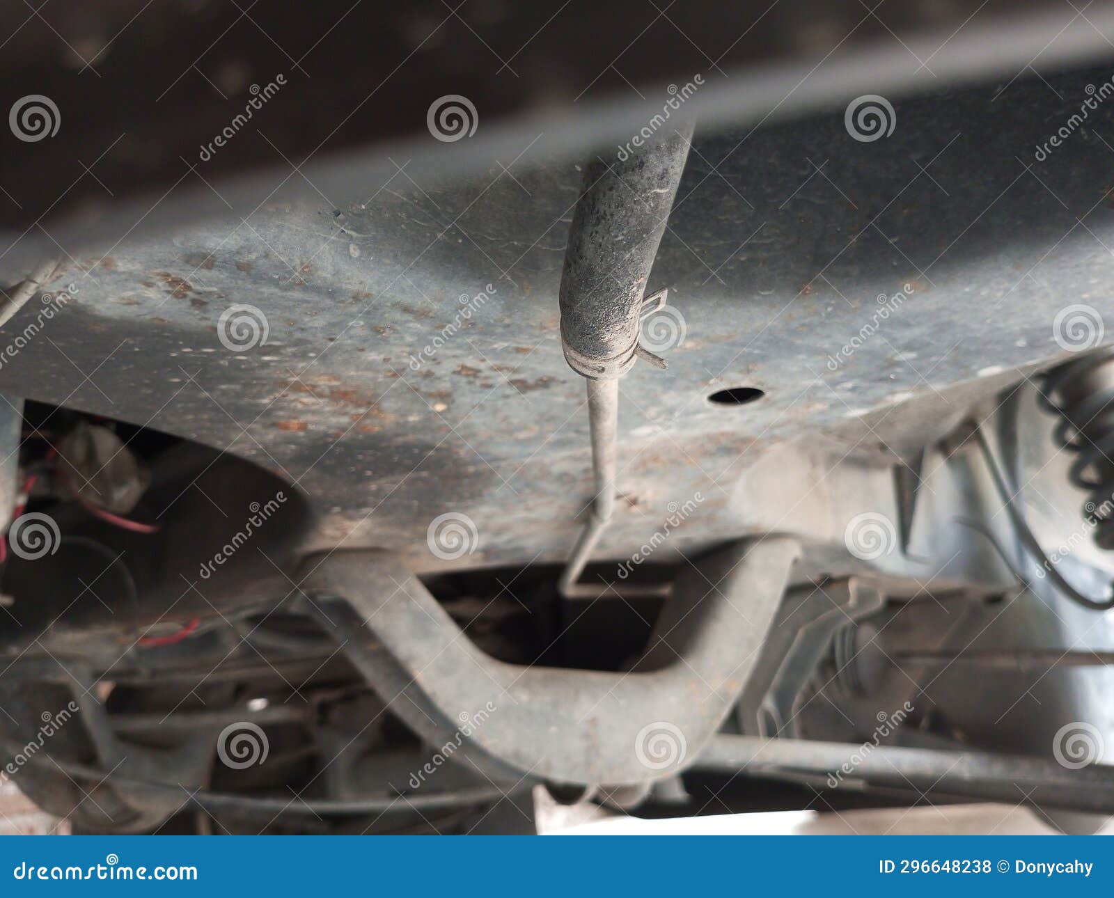 Under the rusty car stock photo. Image of wash, dirty - 296648238