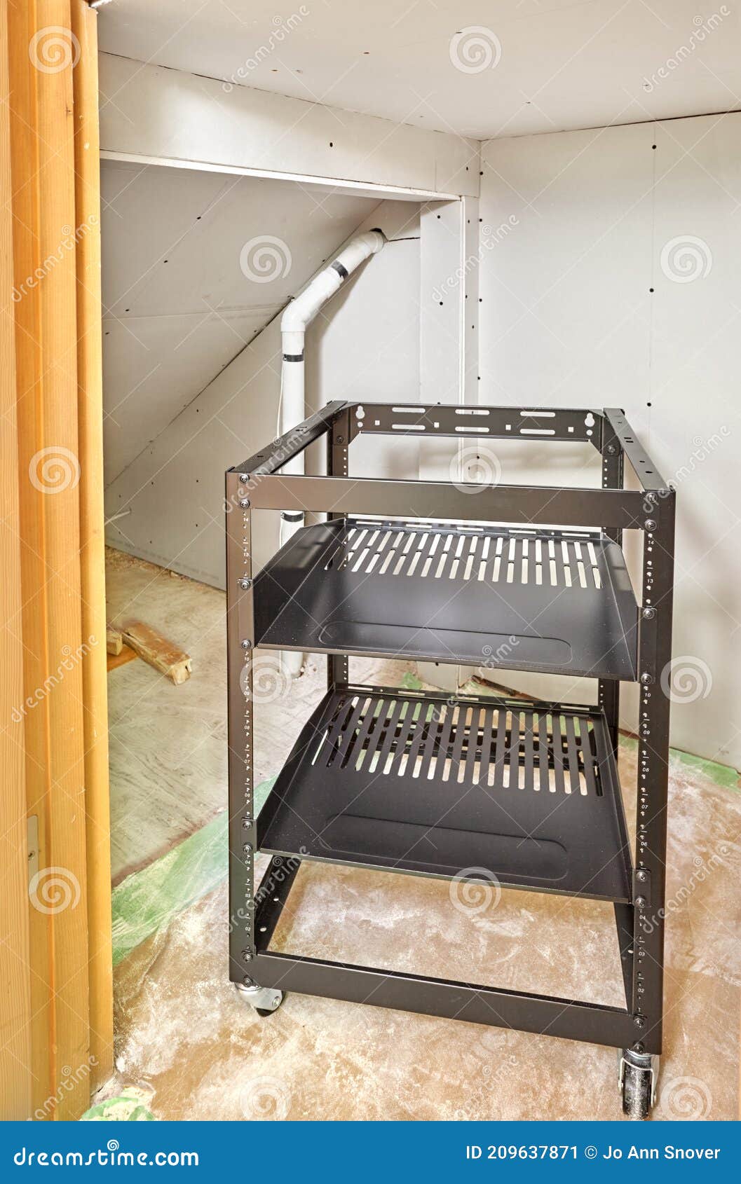 Under Stair Network Closet Drywalled Stock Image - Image of closet ...