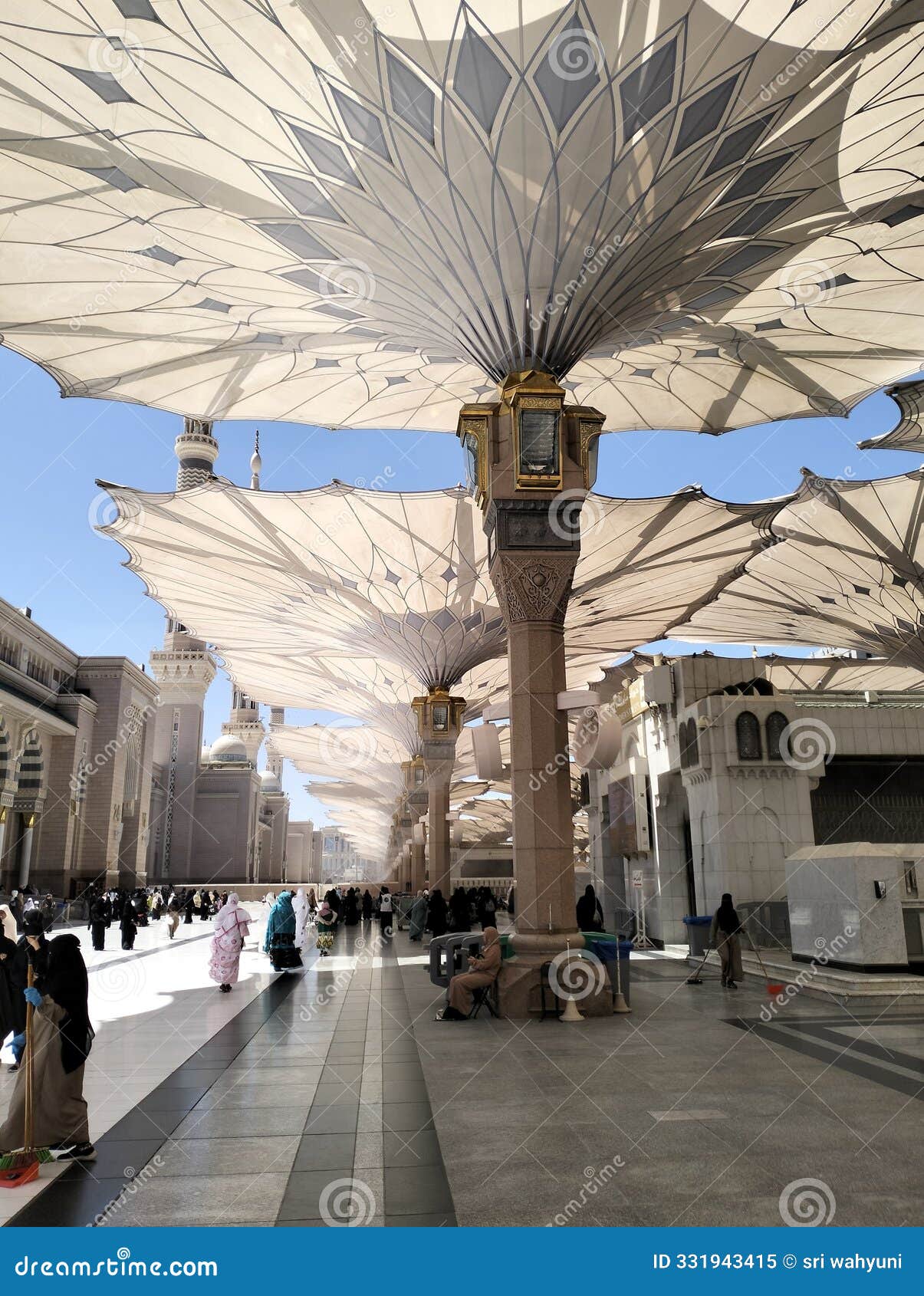 Under an Umbrella in the Front Yard of the Nabawi Mosque in Medina ...