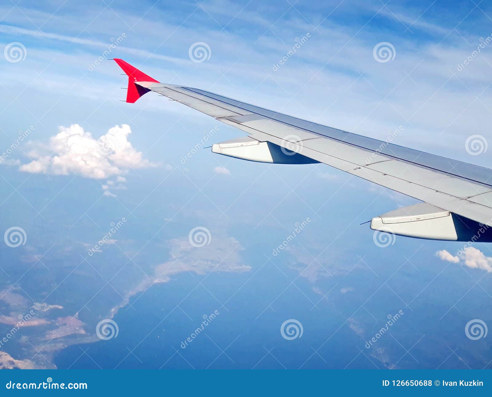 Under the Wing of the Plane. Panoramic View of the Blue Sky with Clouds ...