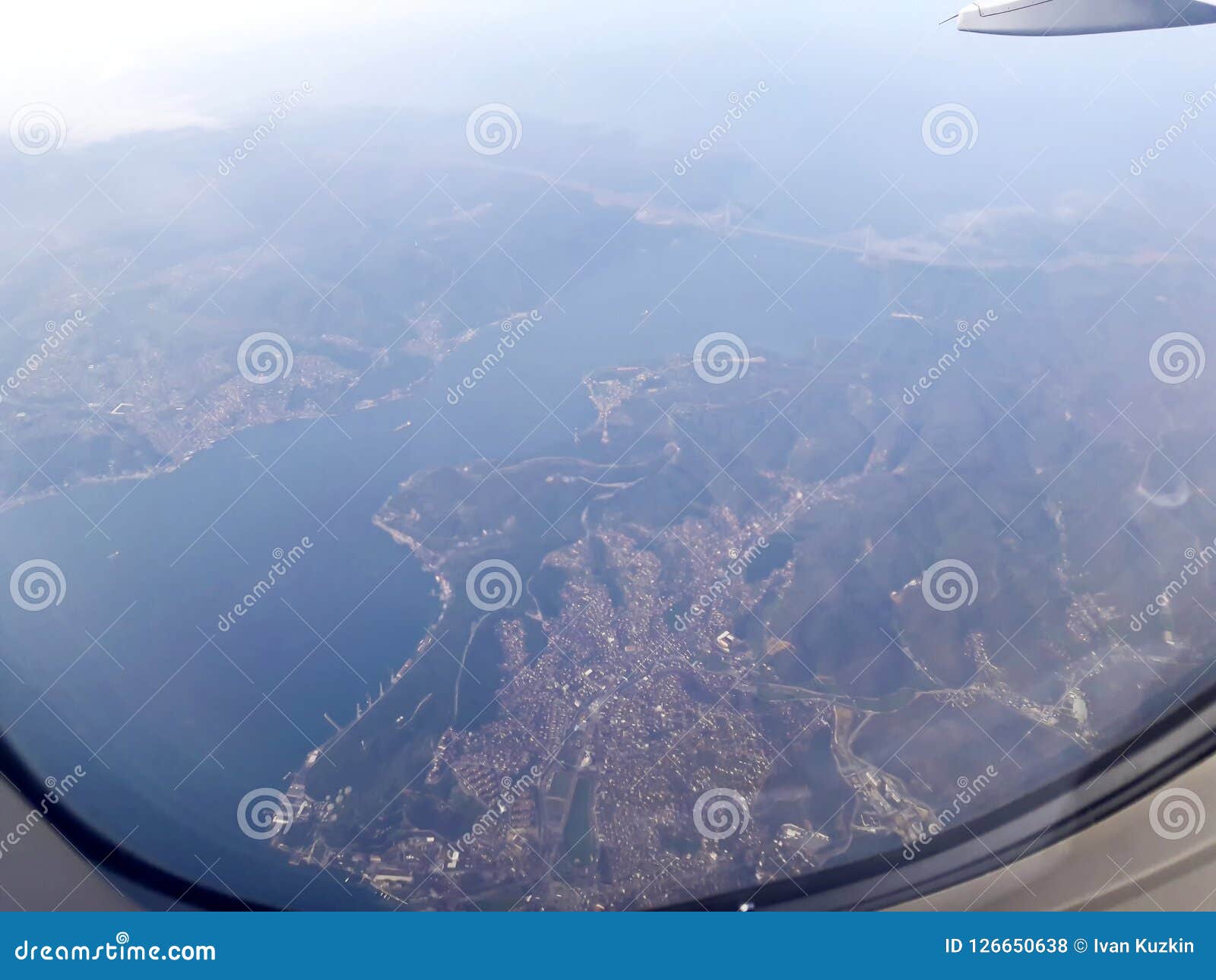 Under the Wing of the Plane. Panoramic View of the Blue Sky with Clouds ...