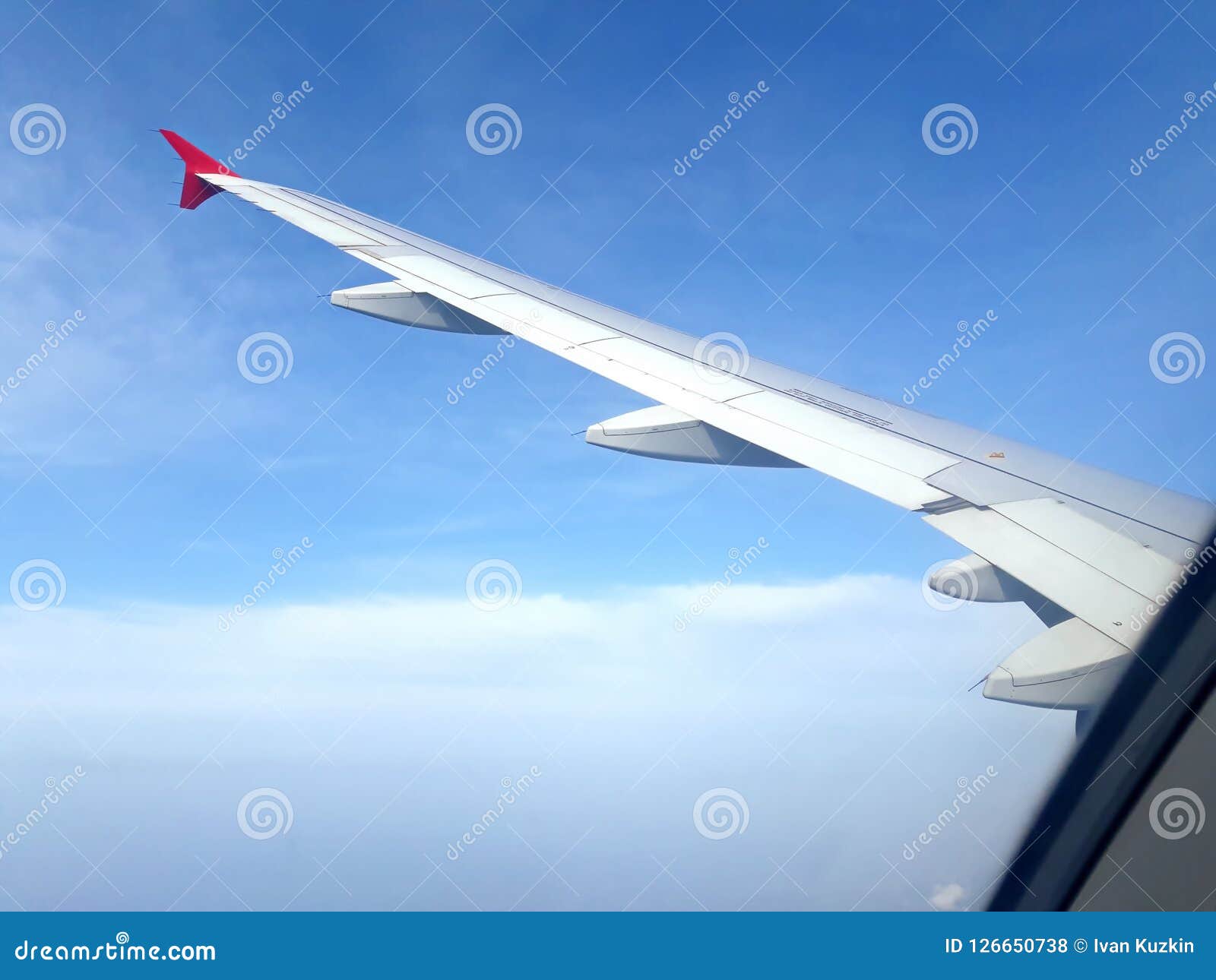 Under the Wing of the Plane. Panoramic View of the Blue Sky with Clouds ...
