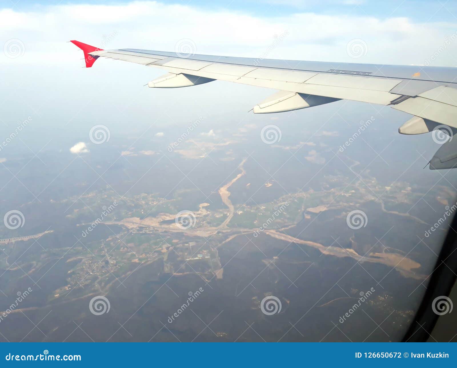 Under the Wing of the Plane. Panoramic View of the Blue Sky with Clouds ...