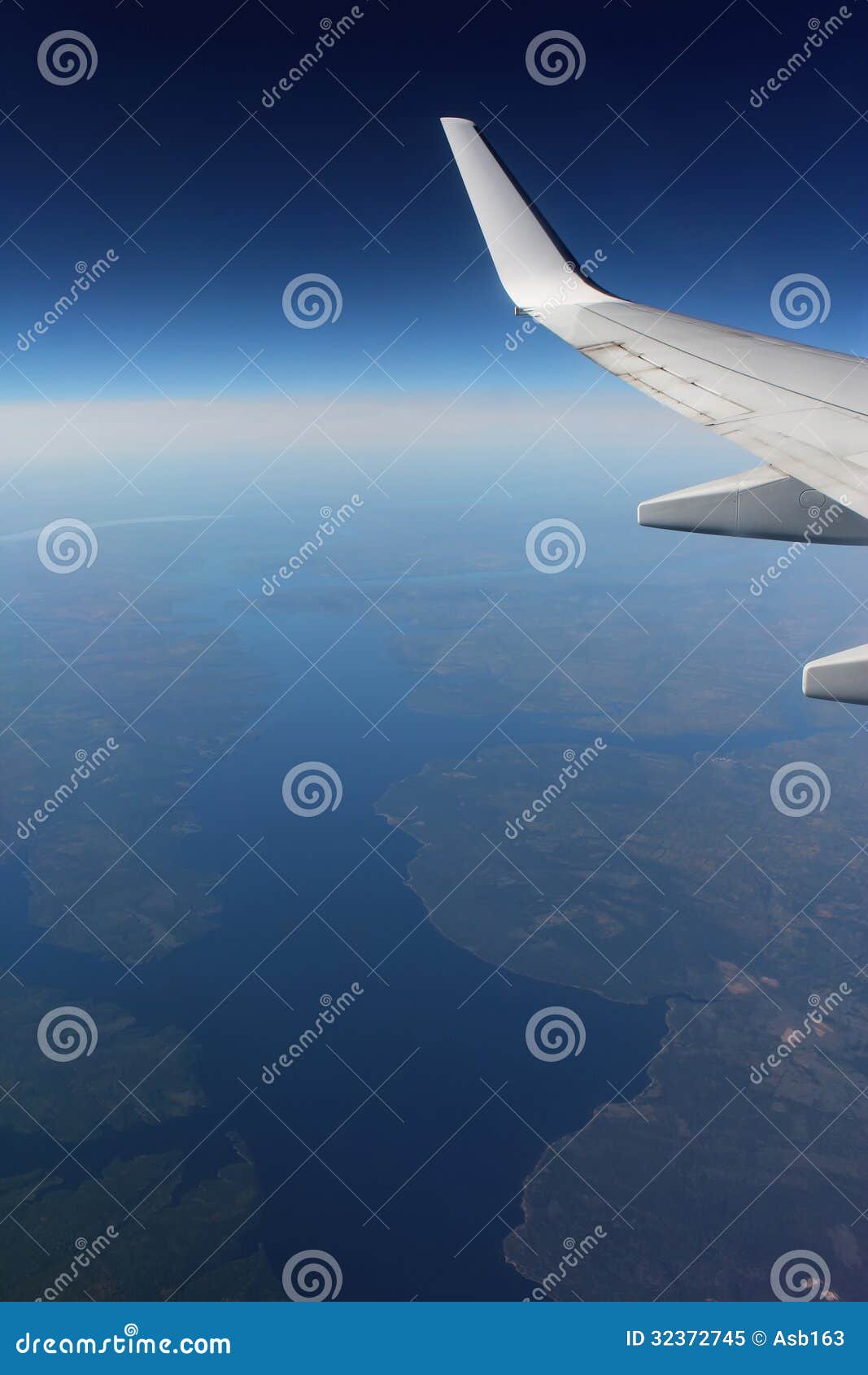 Under the Wing of the Plane Stock Image - Image of mountains ...